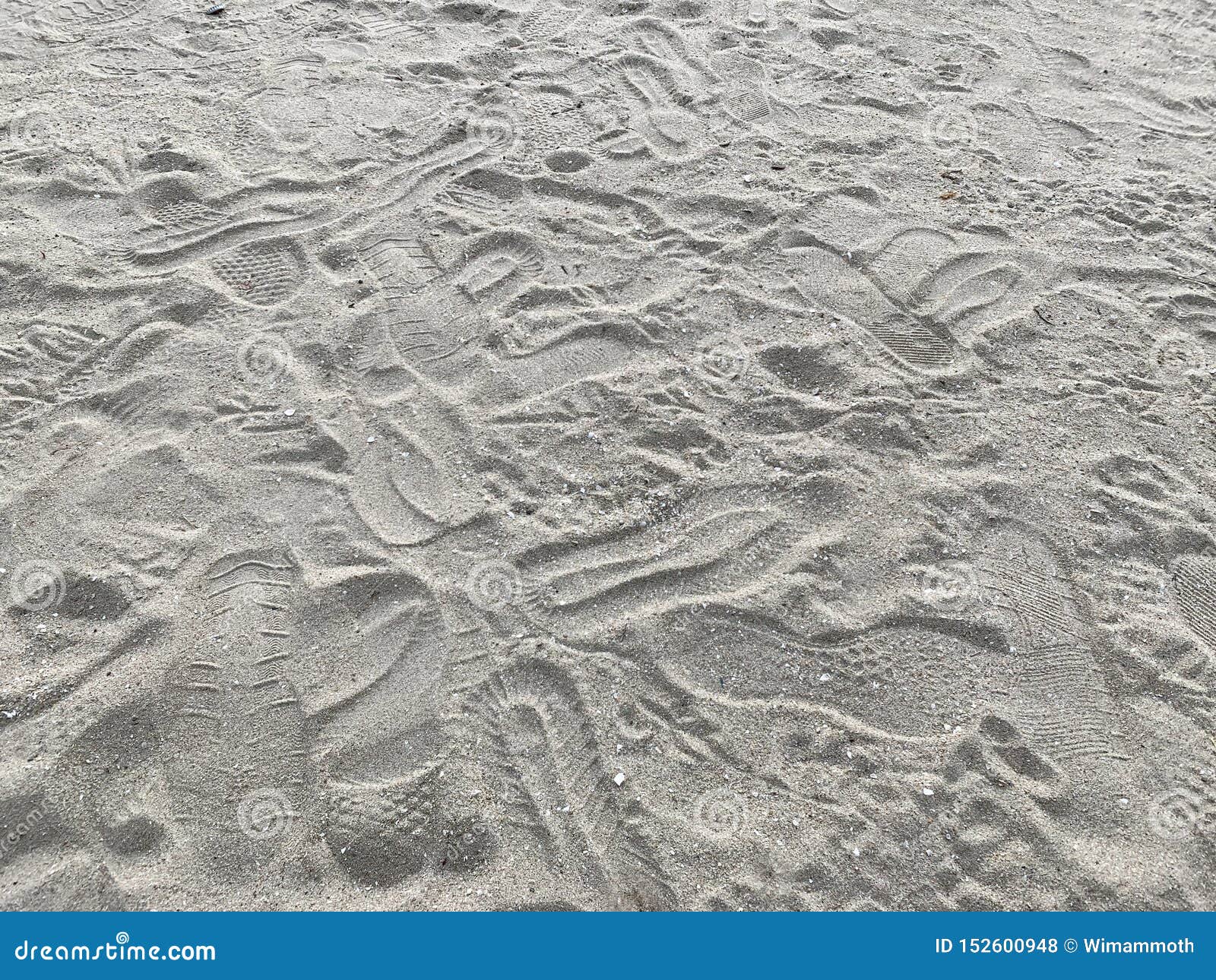 Pattern of Sand with Trampled Footprints from Boots on the Beach Stock ...