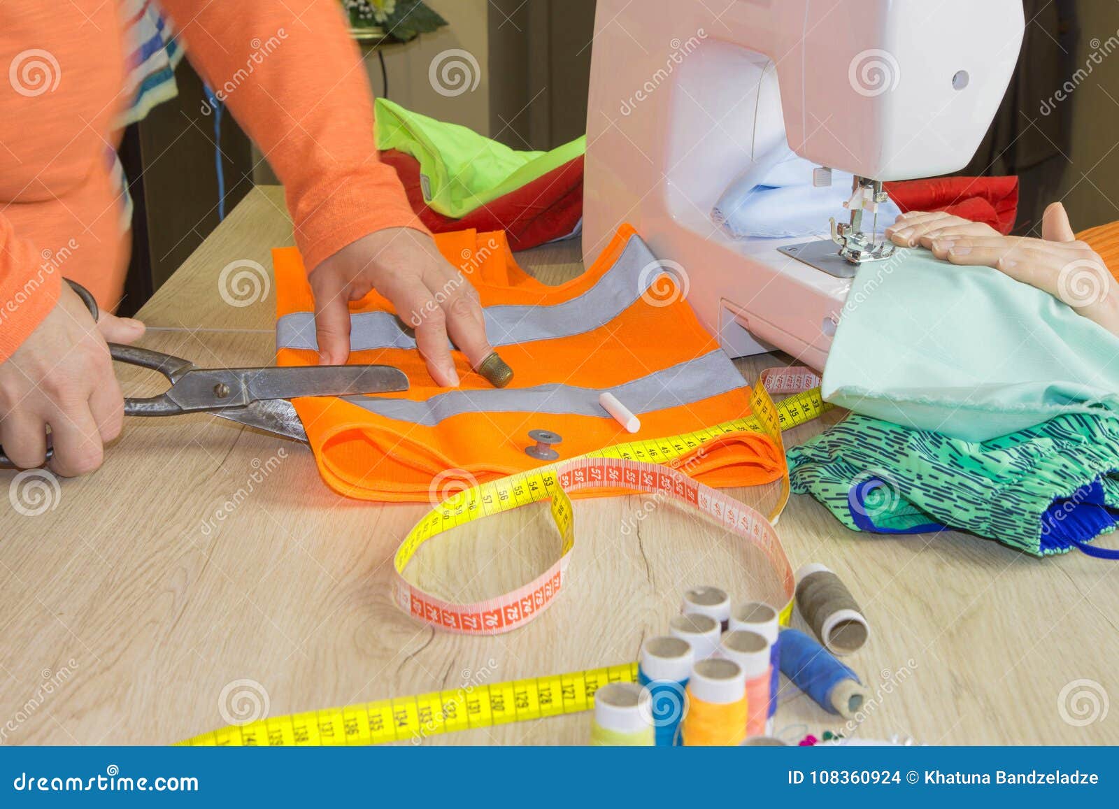 Pattern, Scissors, Tape Measure, and a Sewing Machine. Workplace Stock ...