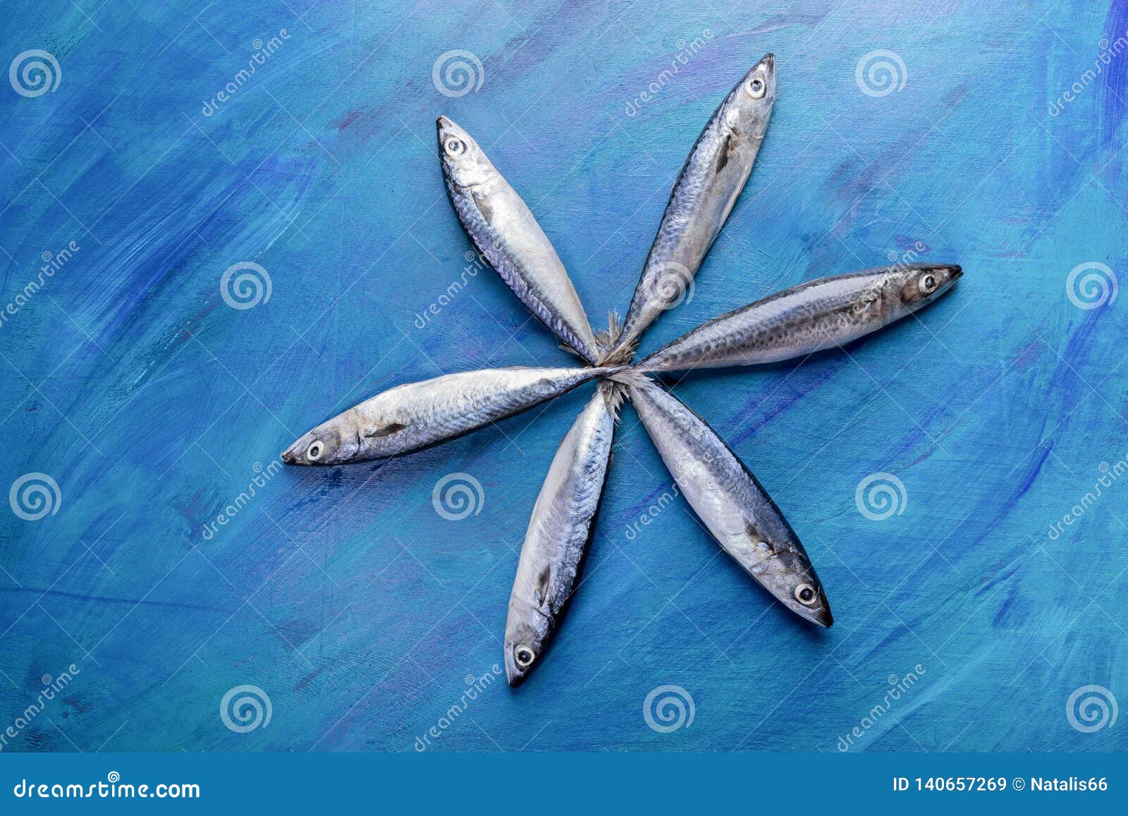 Pattern in Star Form of Mackerel Fishes on Blue Background. Stock Image ...