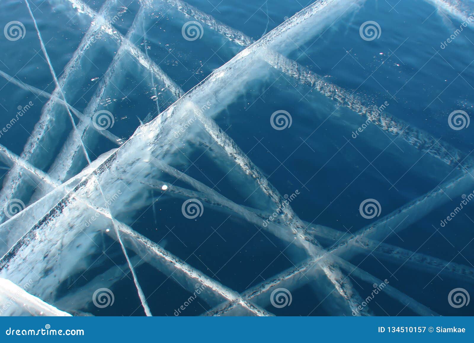 Pattern of White Intersecting Lines in the Dark-blue Ice Stock Image ...