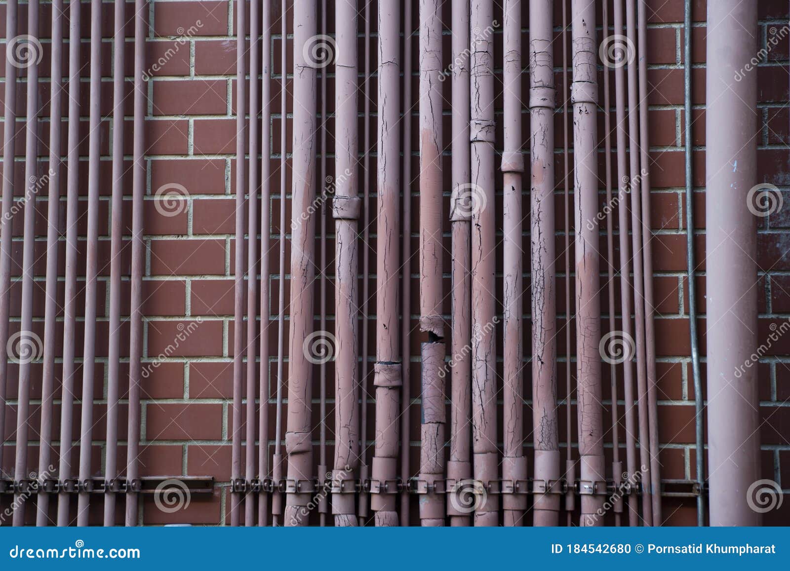 Patterned Electrical Conduit on Brick Wall Texture Background Stock ...