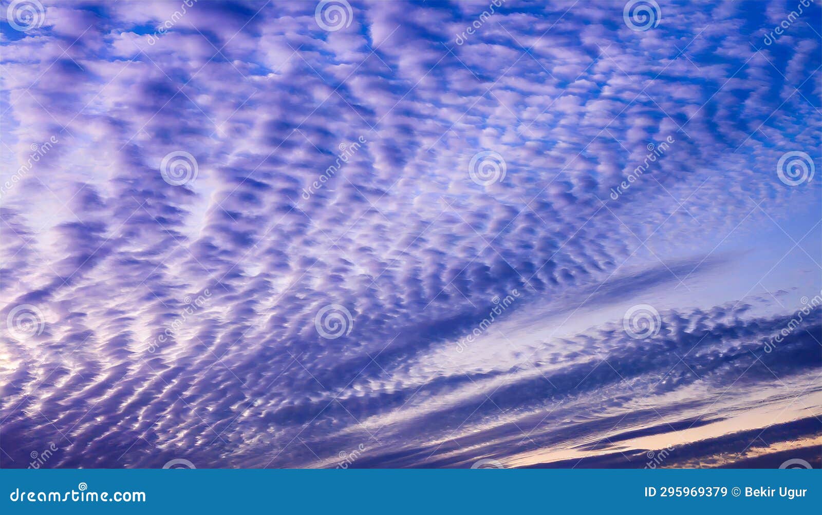 Patterned Fluffy Purple or Ultra Violet Clouds in Blue Sky Stock ...