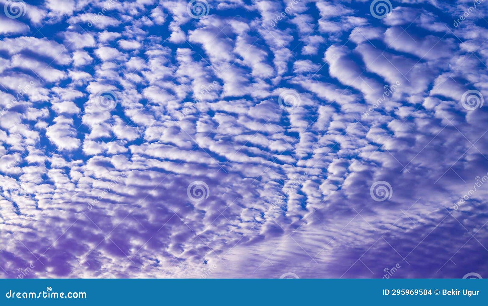 Patterned Fluffy Purple or Ultra Violet Clouds in Blue Sky Stock ...