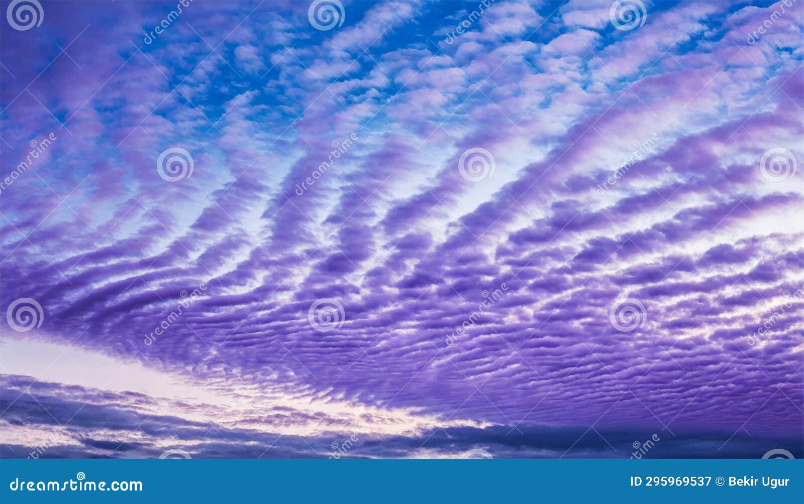 Patterned Fluffy Purple or Ultra Violet Clouds in Blue Sky Stock ...