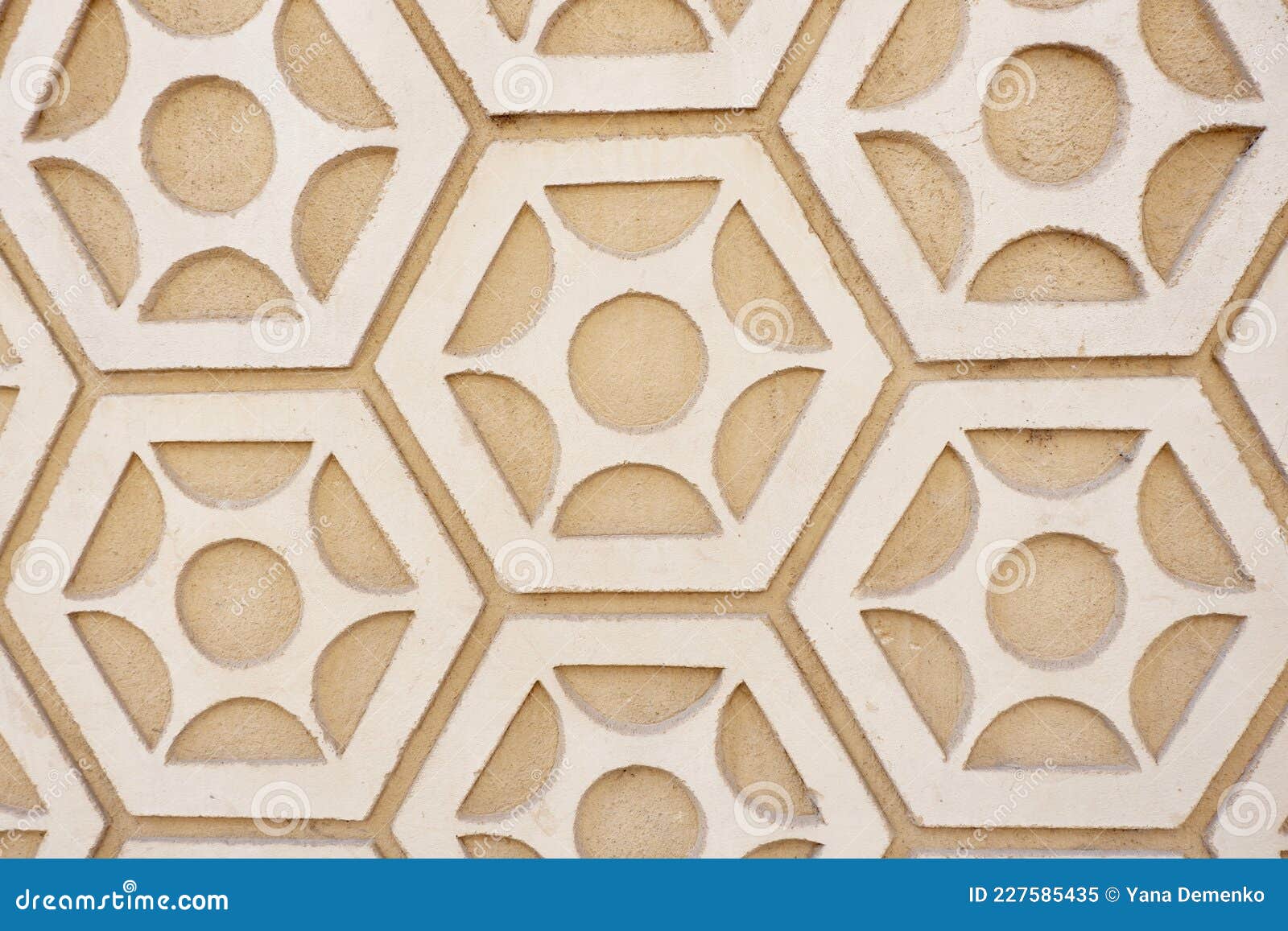 Patterned Ornament in Pentagon Shape on Beige Textured Wall Downtown ...