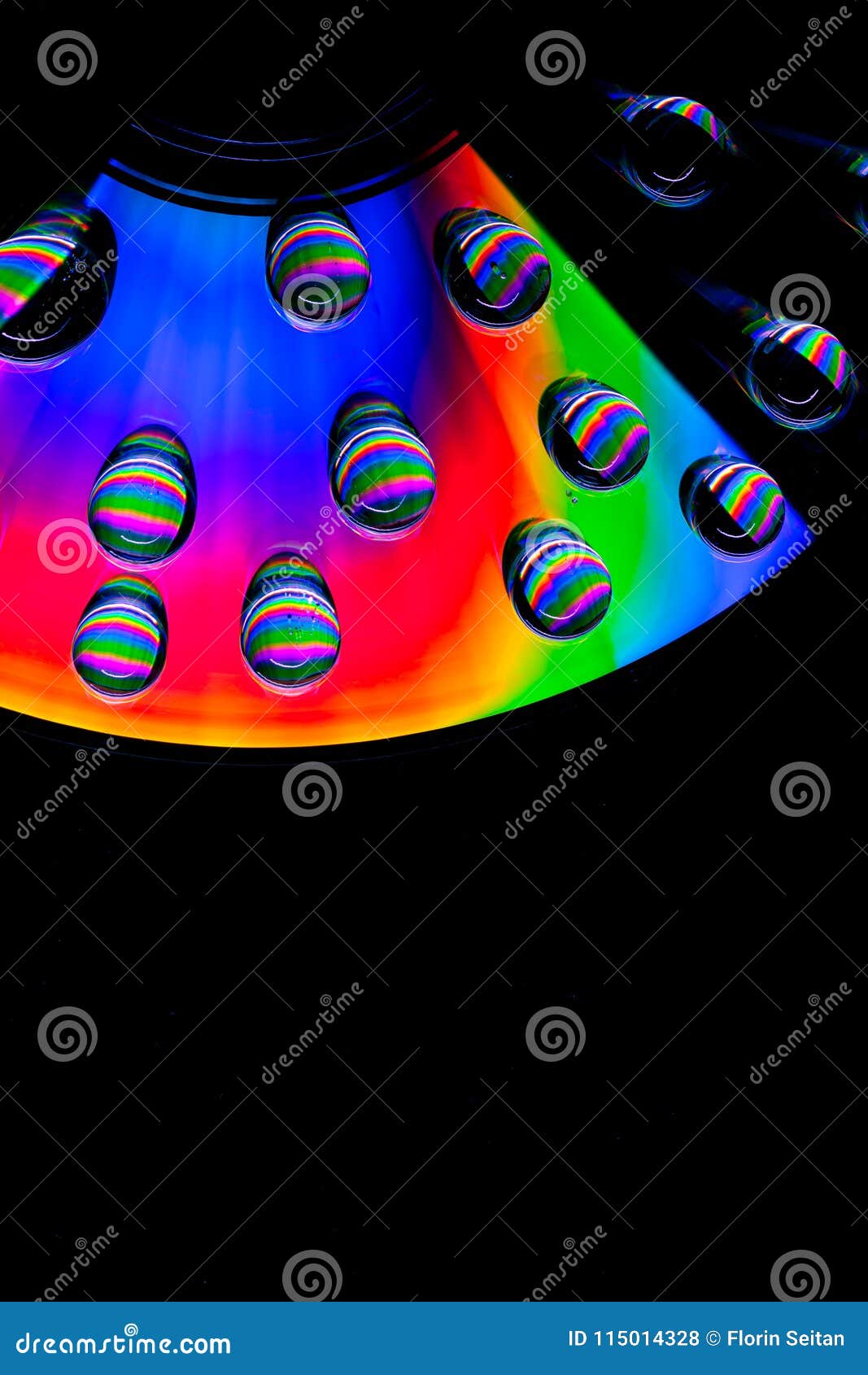 Patterns of Light and Color Created by Water Drops Refracting Light ...