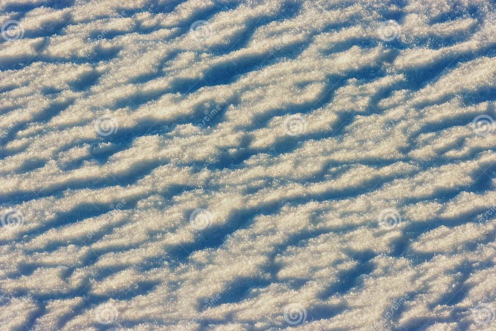 Patterns of Light and Shadow on Freshly Fallen Snow with Undulating ...