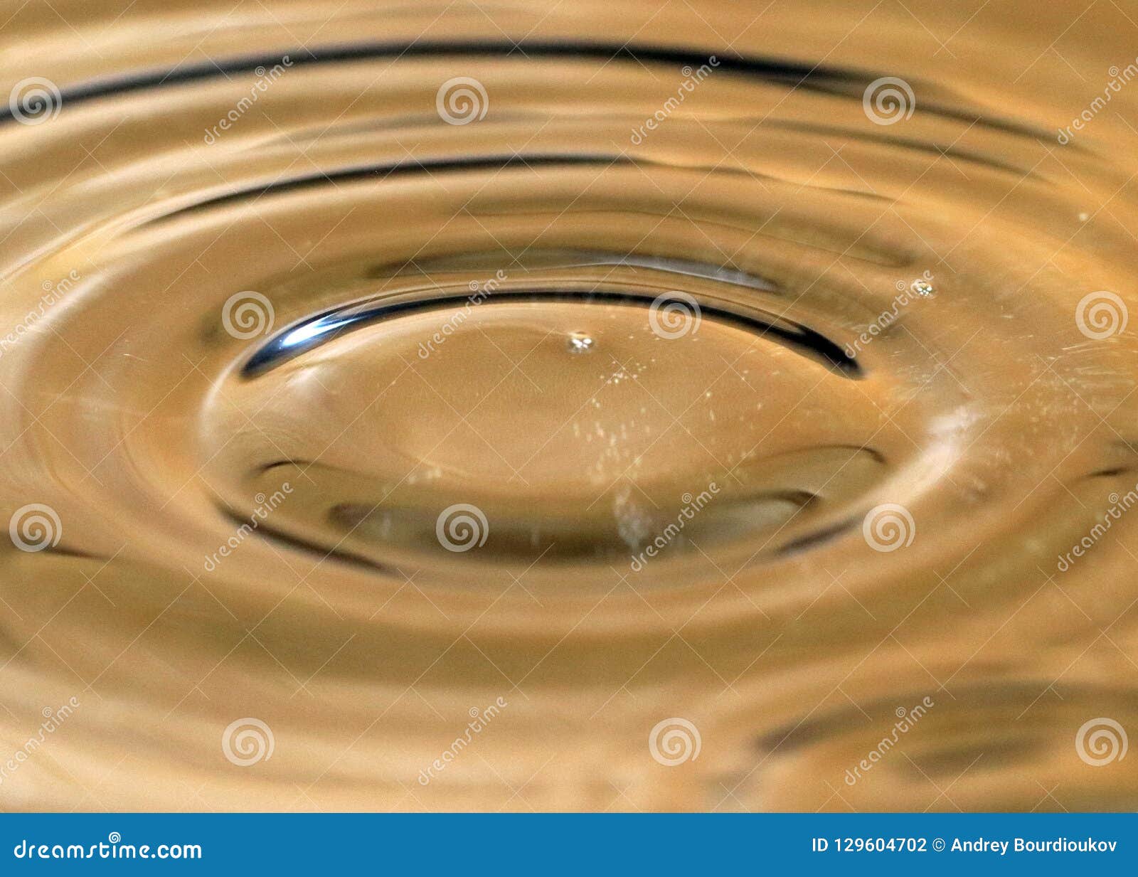 Drop on the water stock photo. Image of beauty, concentric - 129604702