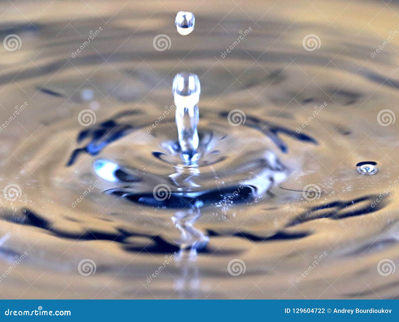 Drop on the water stock photo. Image of bright, reflection - 129604722