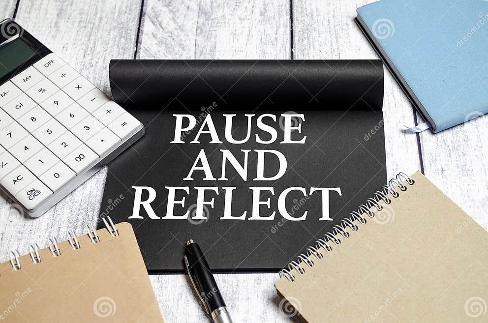 Pause and Reflect the Phrase on Black Paper and Pen Stock Photo - Image ...