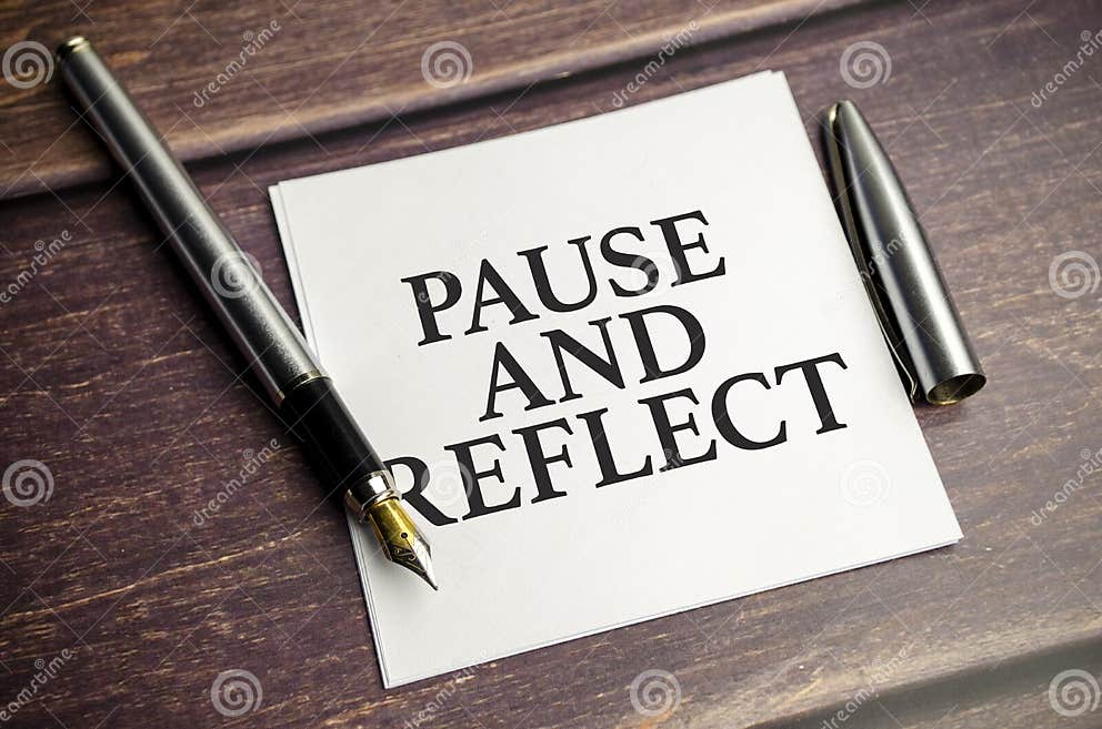 Pause and Reflect the Phrase on White Paper and Pen Stock Photo - Image ...