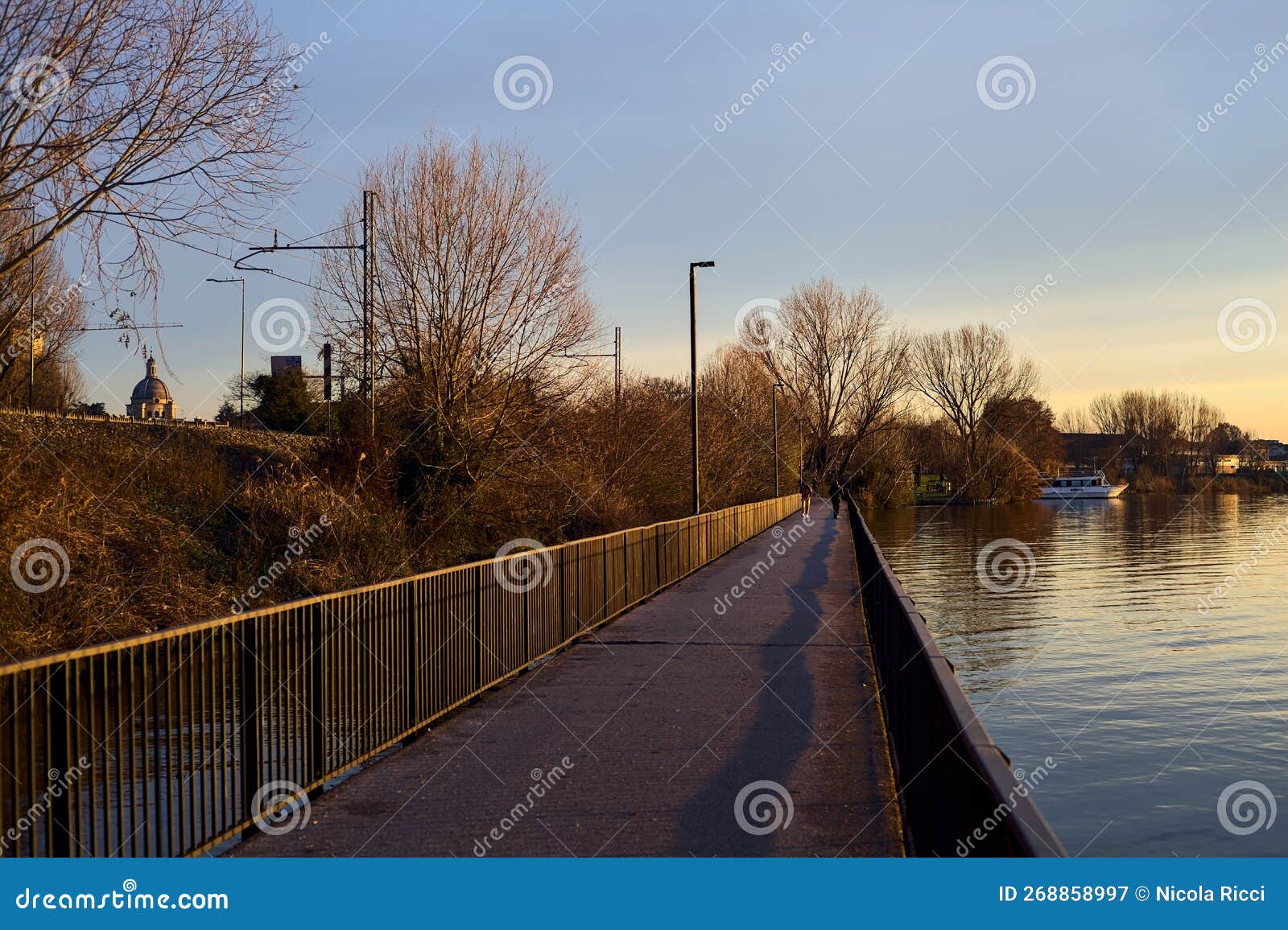 Paved Footbridge in a Park Over a Lake at Sunset Stock Image - Image of ...