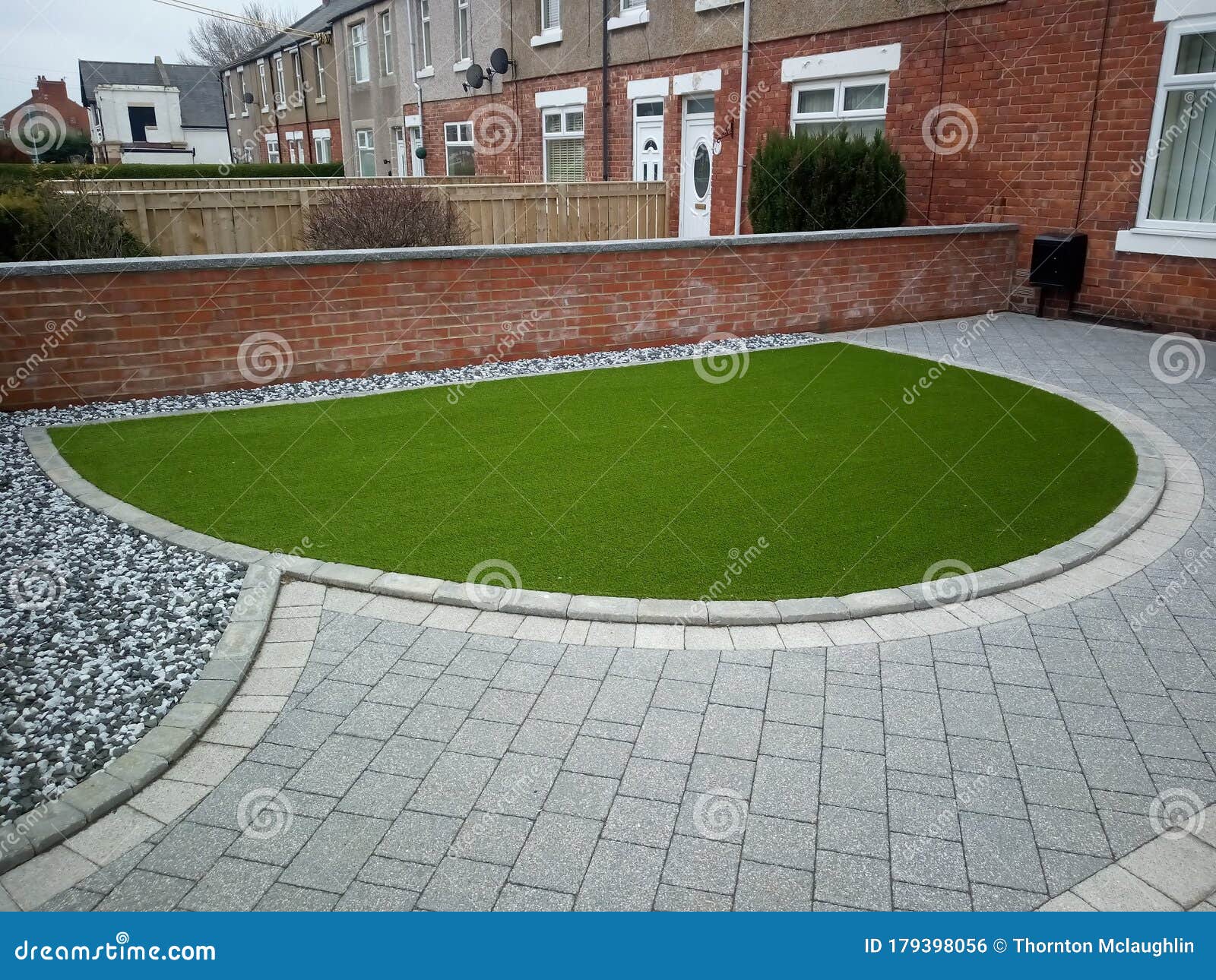 Paved front garden stock photo. Image of courtyard, grass - 179398056