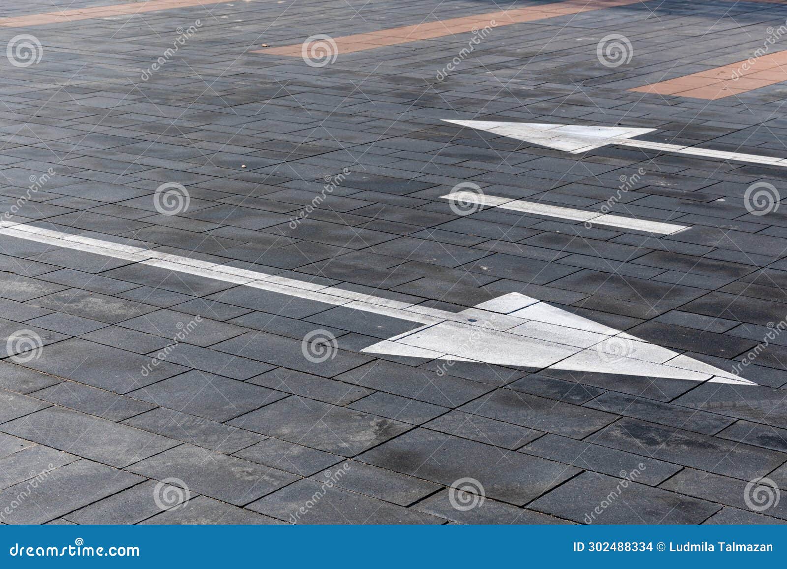Paved Parking Space, Arrow Drawn on the Road Stock Photo - Image of ...