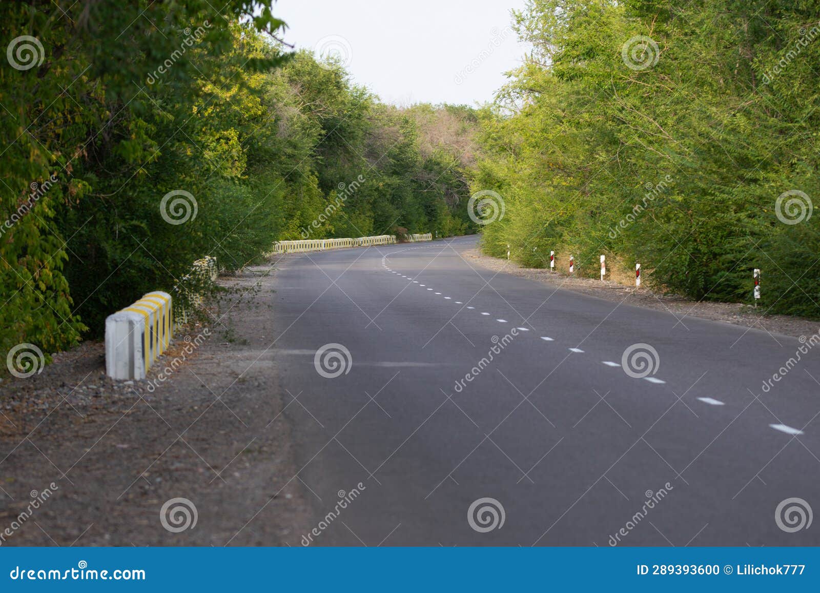 Paved Road Around the Corner Stock Photo - Image of markup, background ...