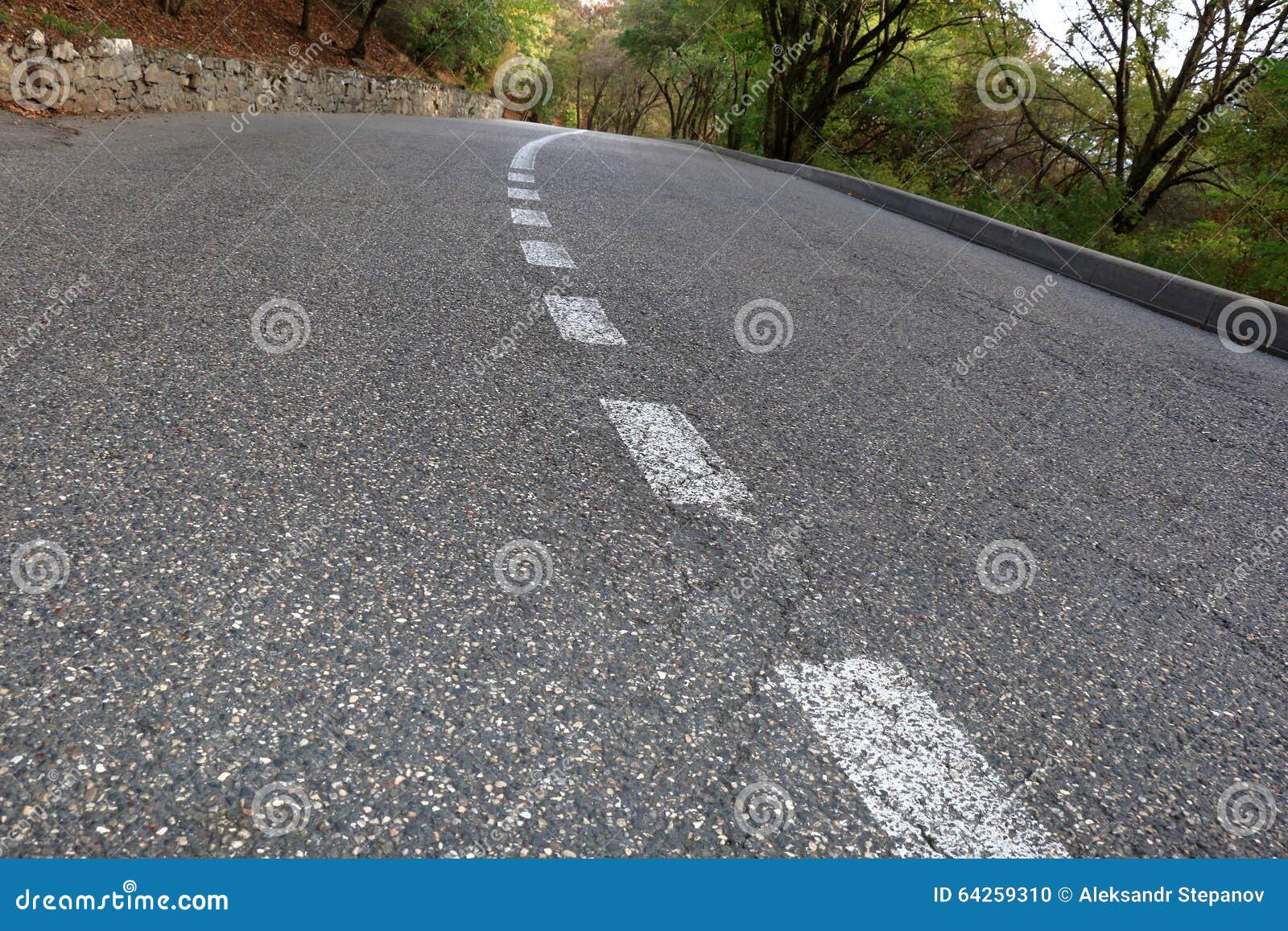 Paved Road with Dividing Line. Focus on Foreground Stock Photo - Image ...