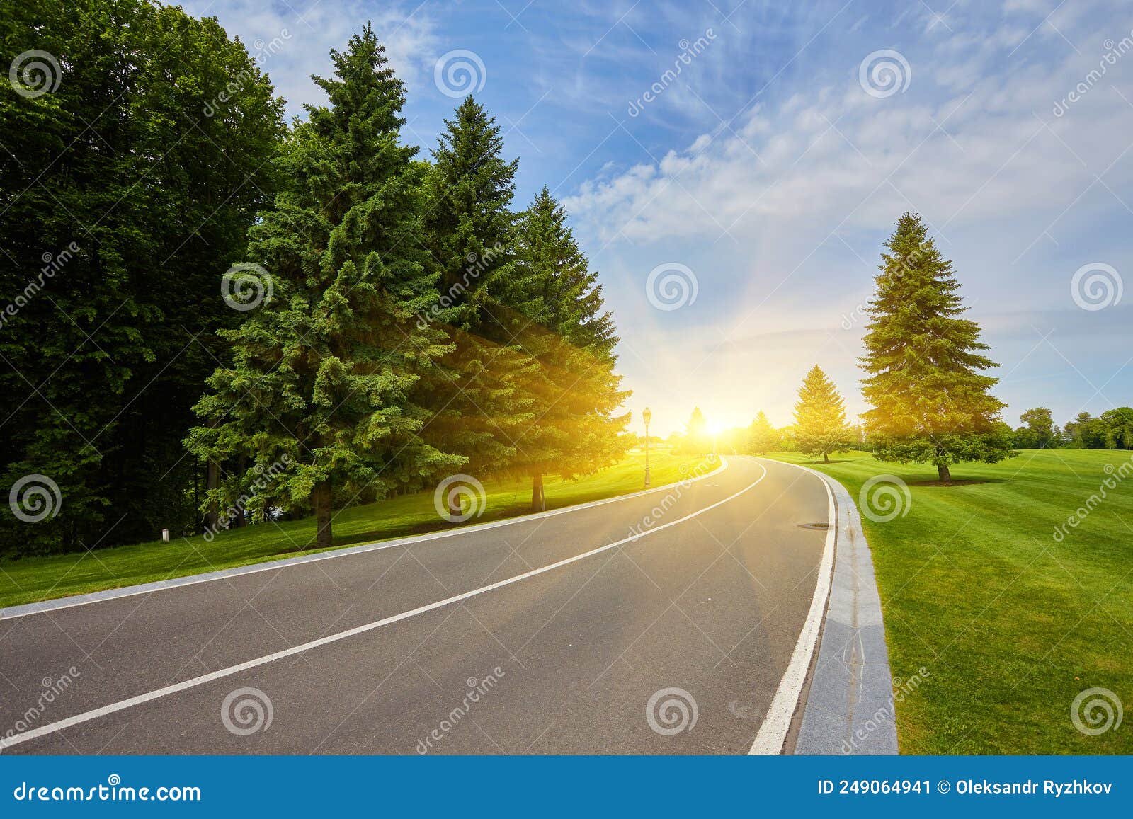 The Paved Road Up the Side of the Trees, a Freight Train on a Sunny Day ...