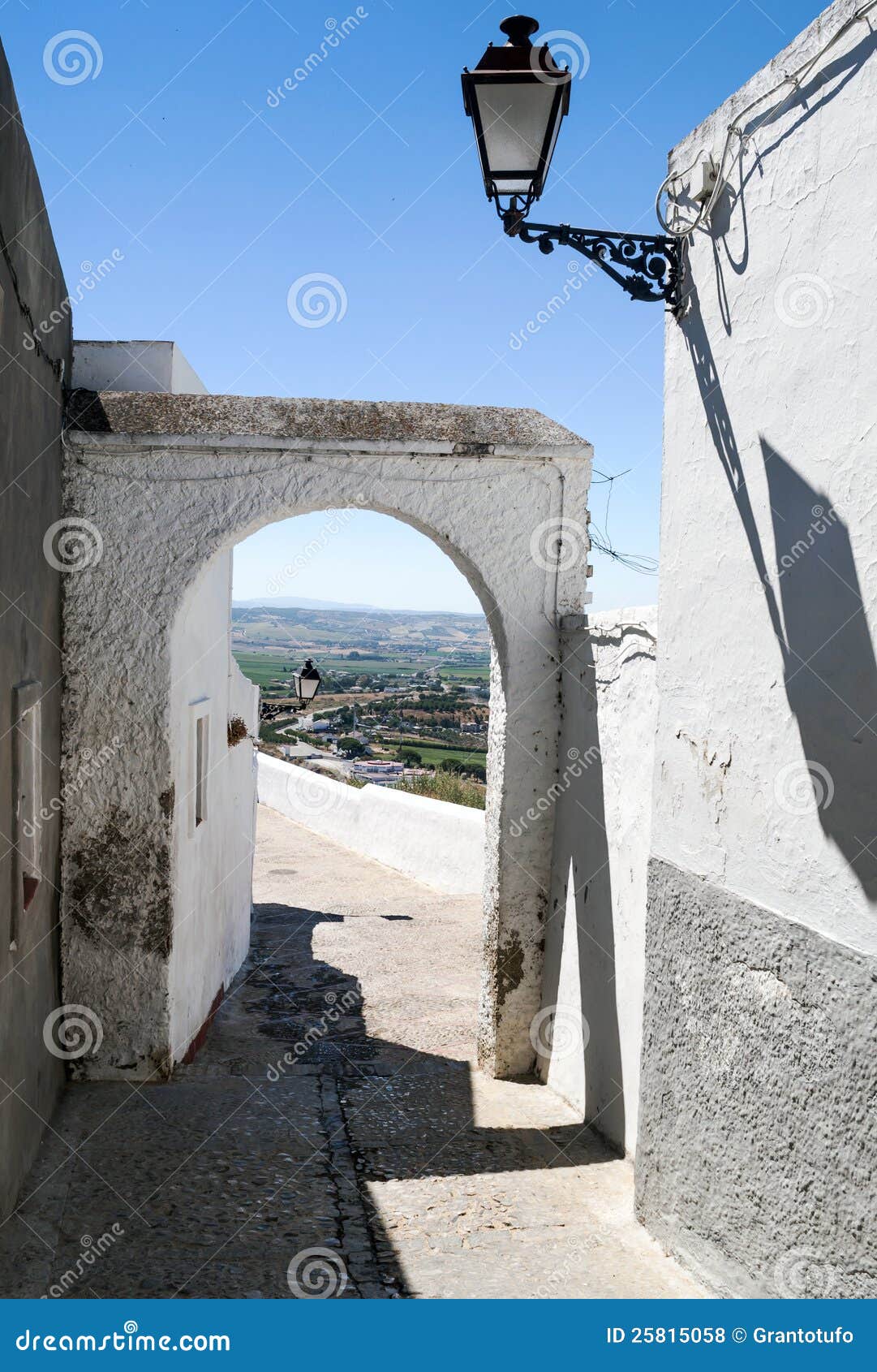 Paved street with arches stock photo. Image of landscape - 25815058