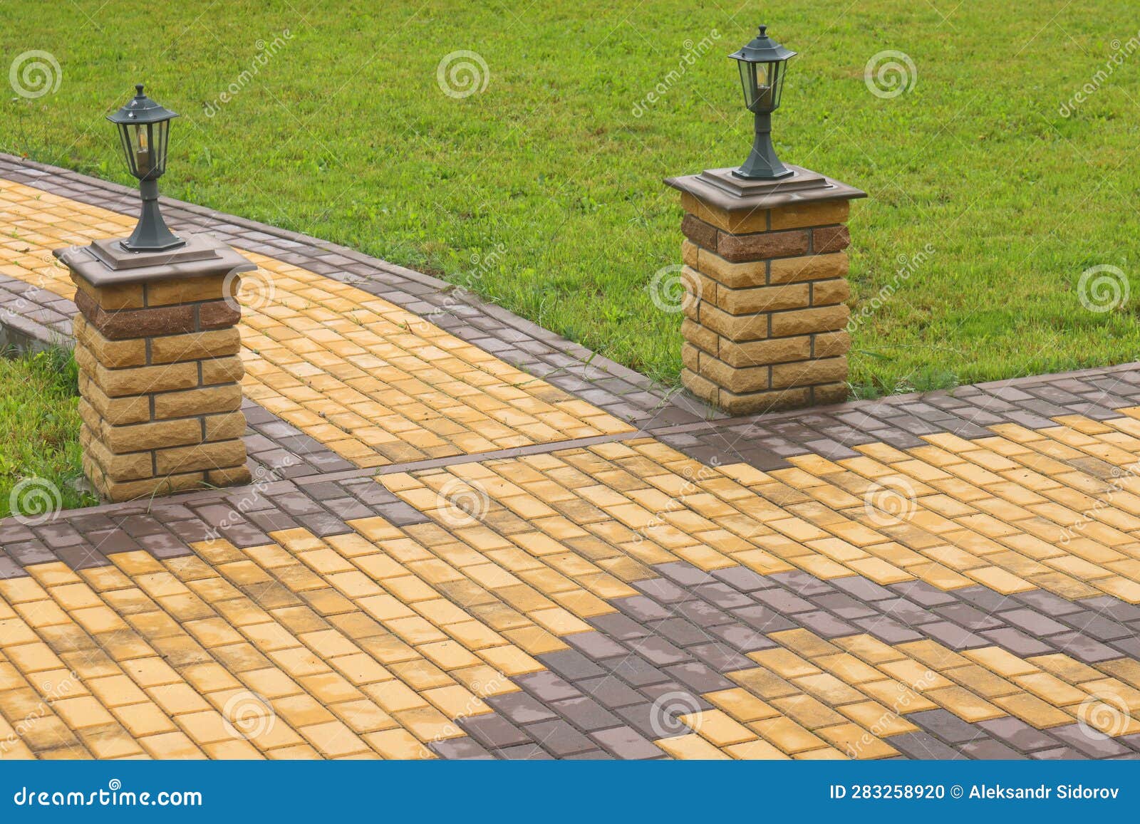 Paved with Tiles Path in the Park. Paving Slabs and Lanterns in a Park ...