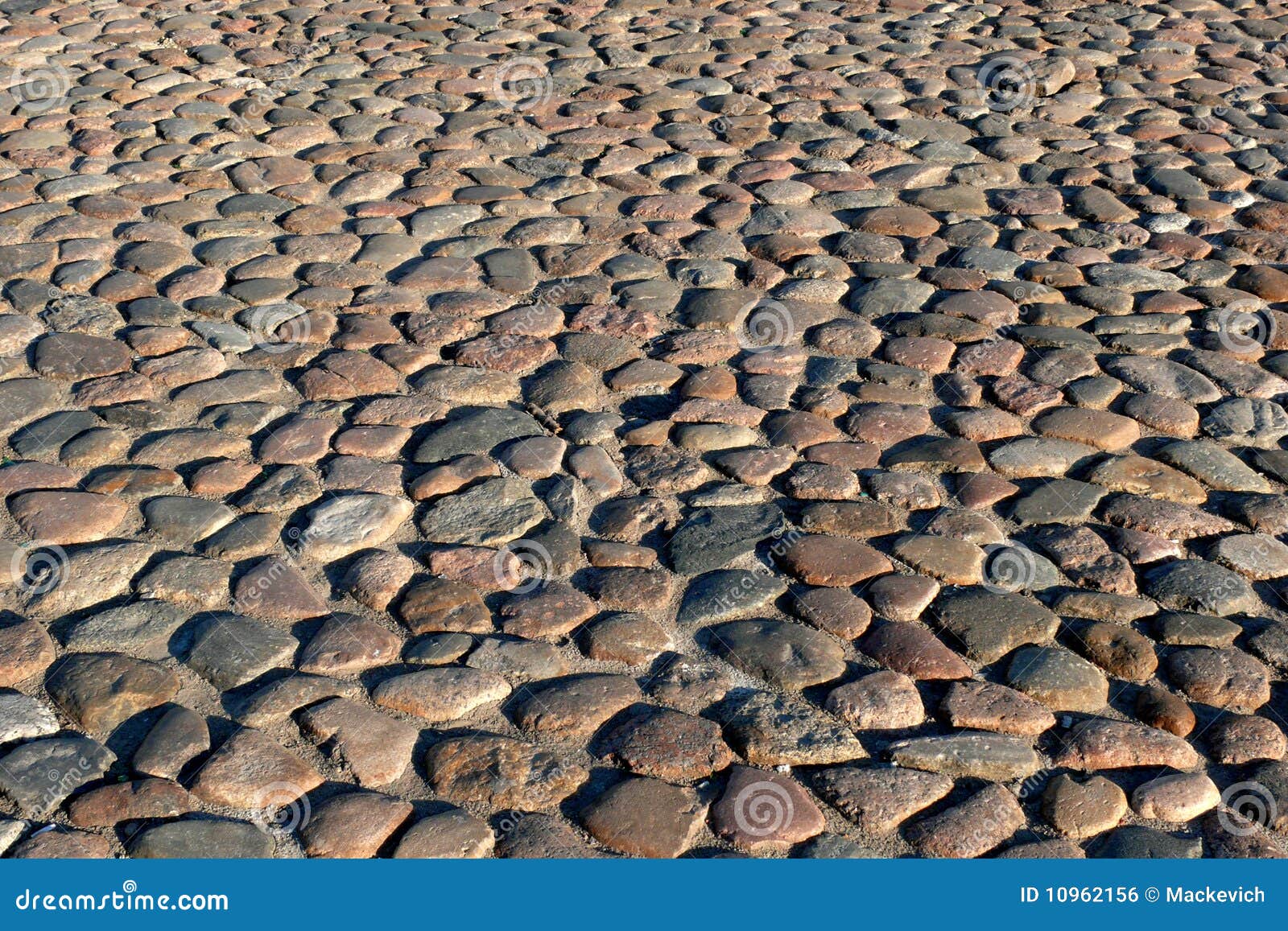 The Pavement of Cobblestones. Stock Photo - Image of laying, time: 10962156