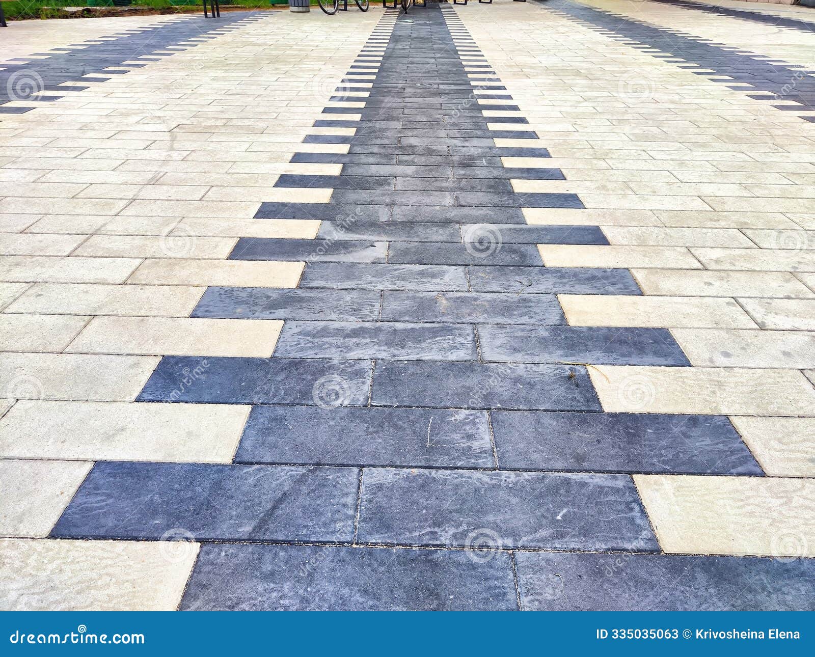 Pavement Design Featuring Alternating Black and Gray Tiles in a Linear ...