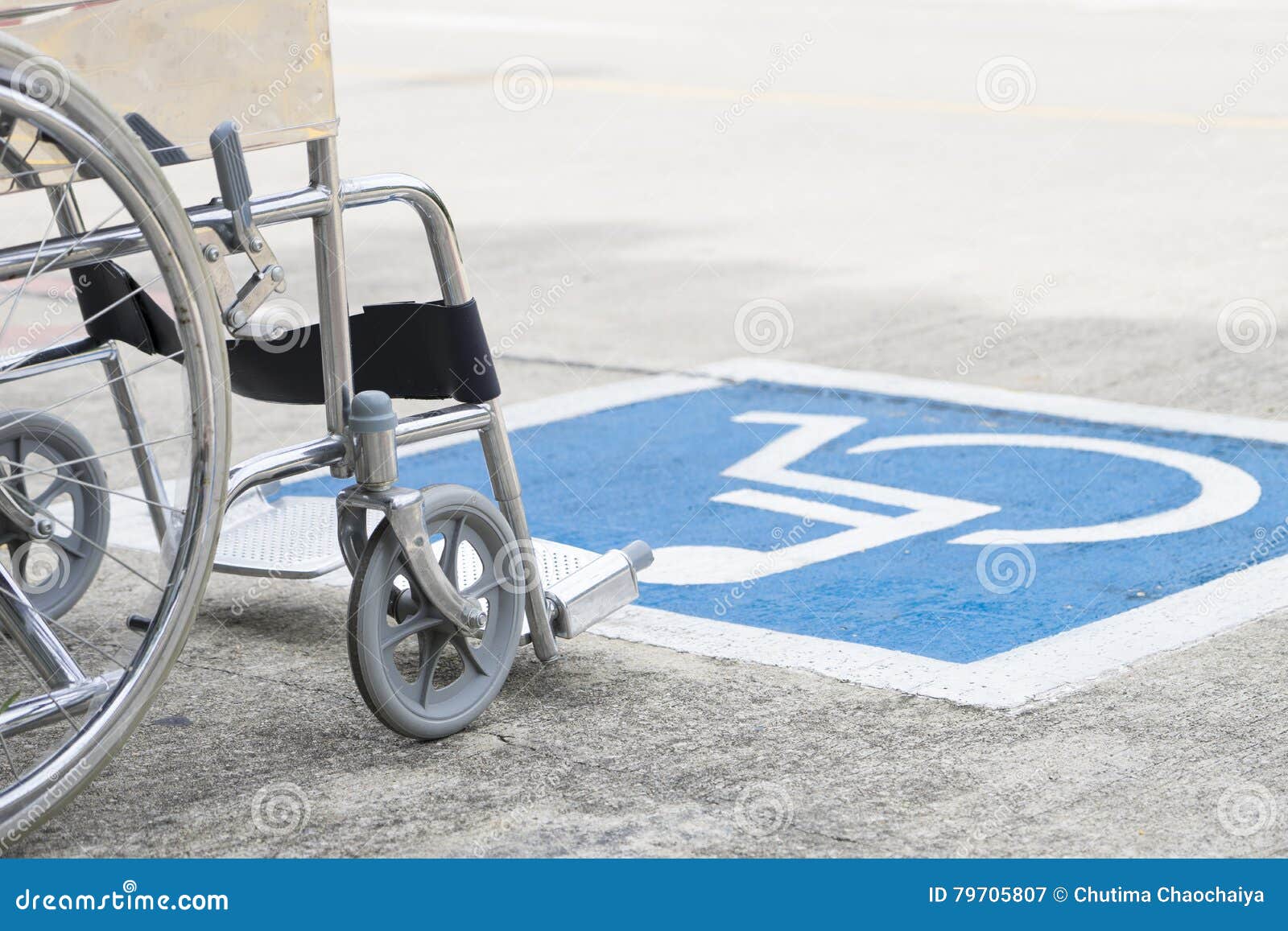 Pavement Handicap Symbol and Wheelchair Stock Image - Image of blue ...