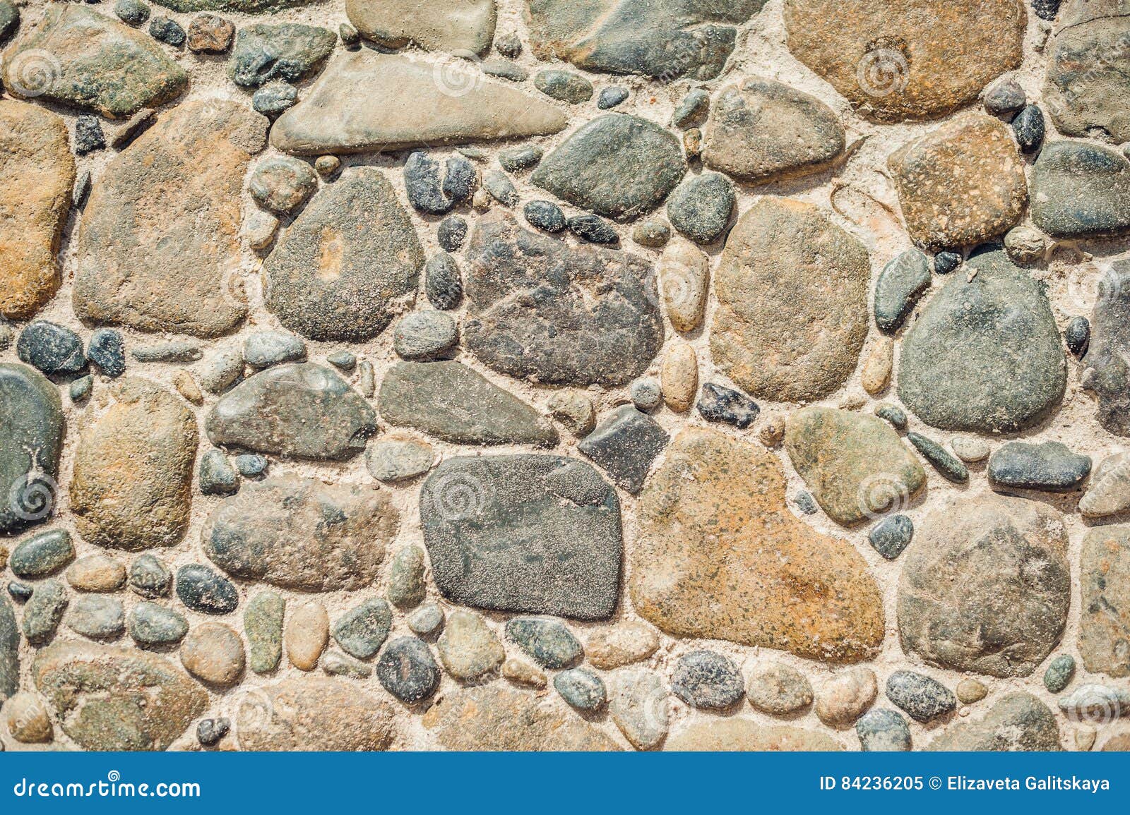 Paving Blocks Made of Round Stones and Concrete Path. Stock Image ...