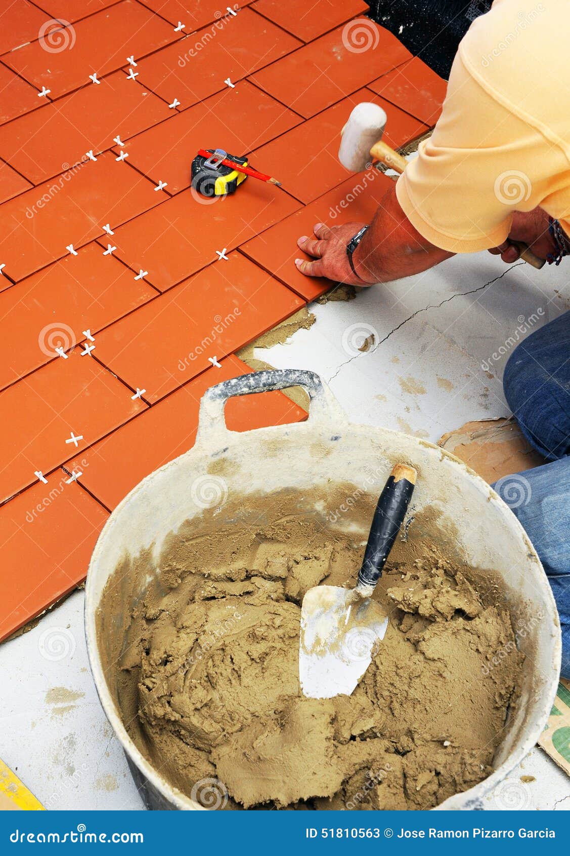 Paving the Floor of the Terrace of a House with Ceramic Tile Stock ...