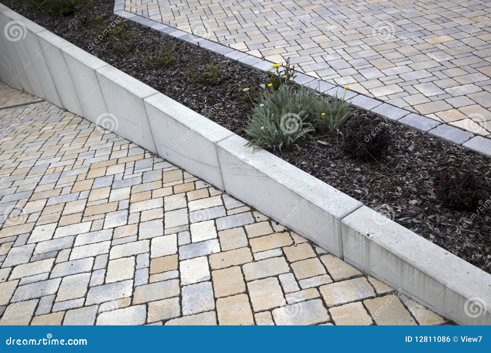 Paving and flower border stock photo. Image of craftsmanship - 12811086