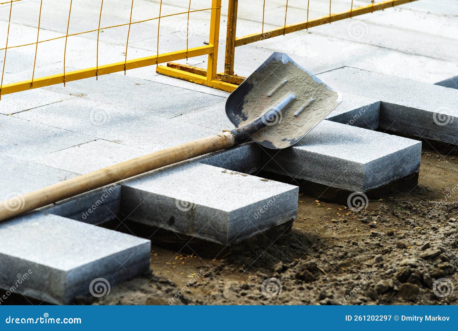 Paving the Footpath. Granite Blocks Laid on a Sandy Surface Stock Image ...