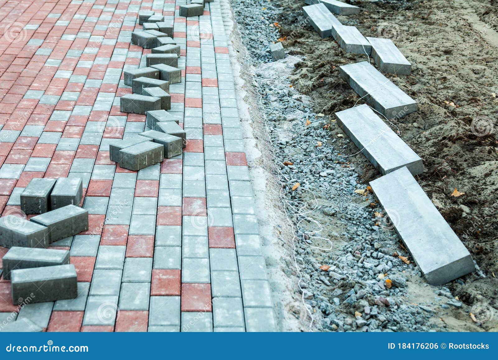 Paving the footpath stock photo. Image of building, foot - 184176206