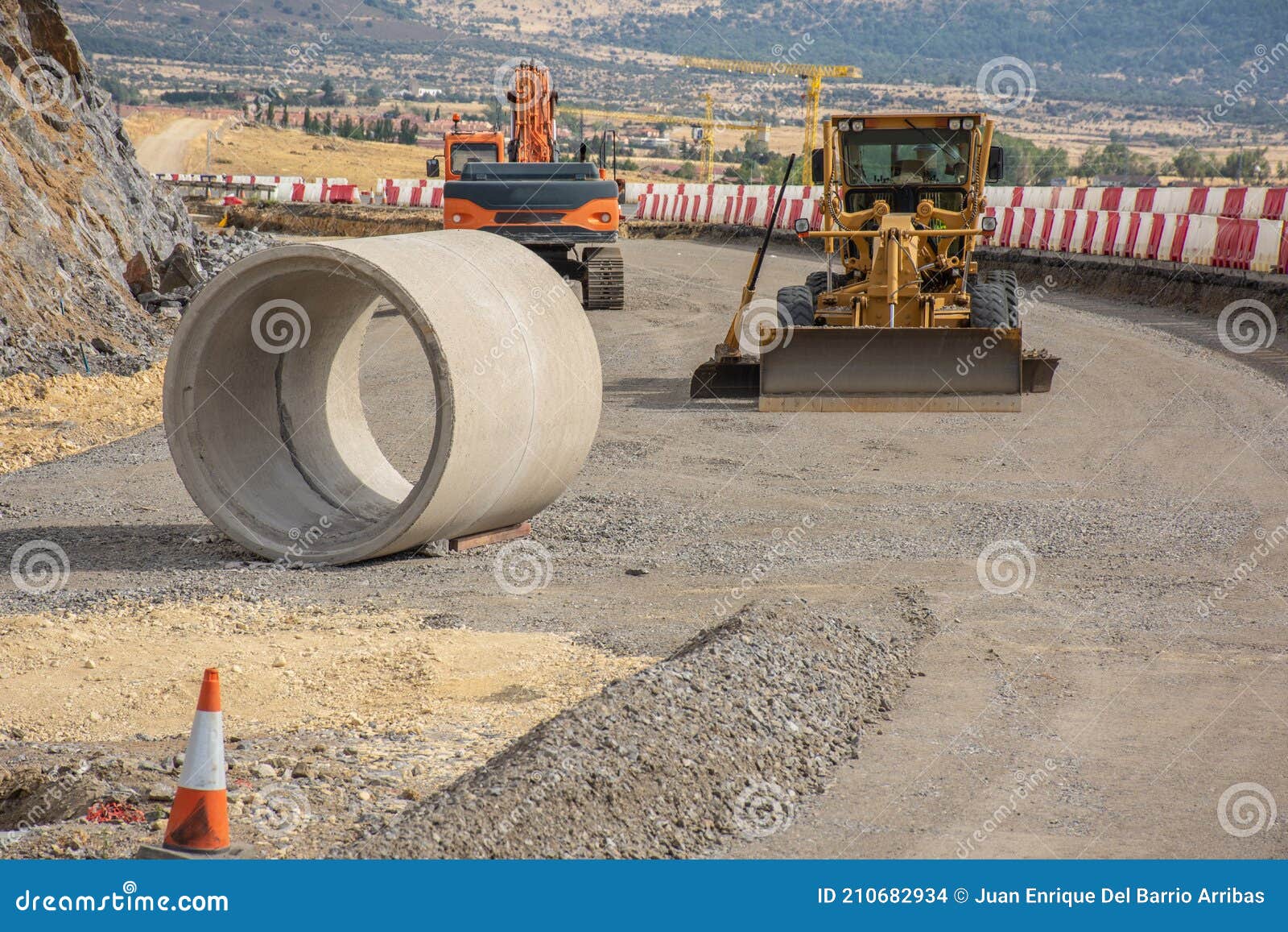Paving the Ground at Road Construction Works with a Bulldozer Stock ...