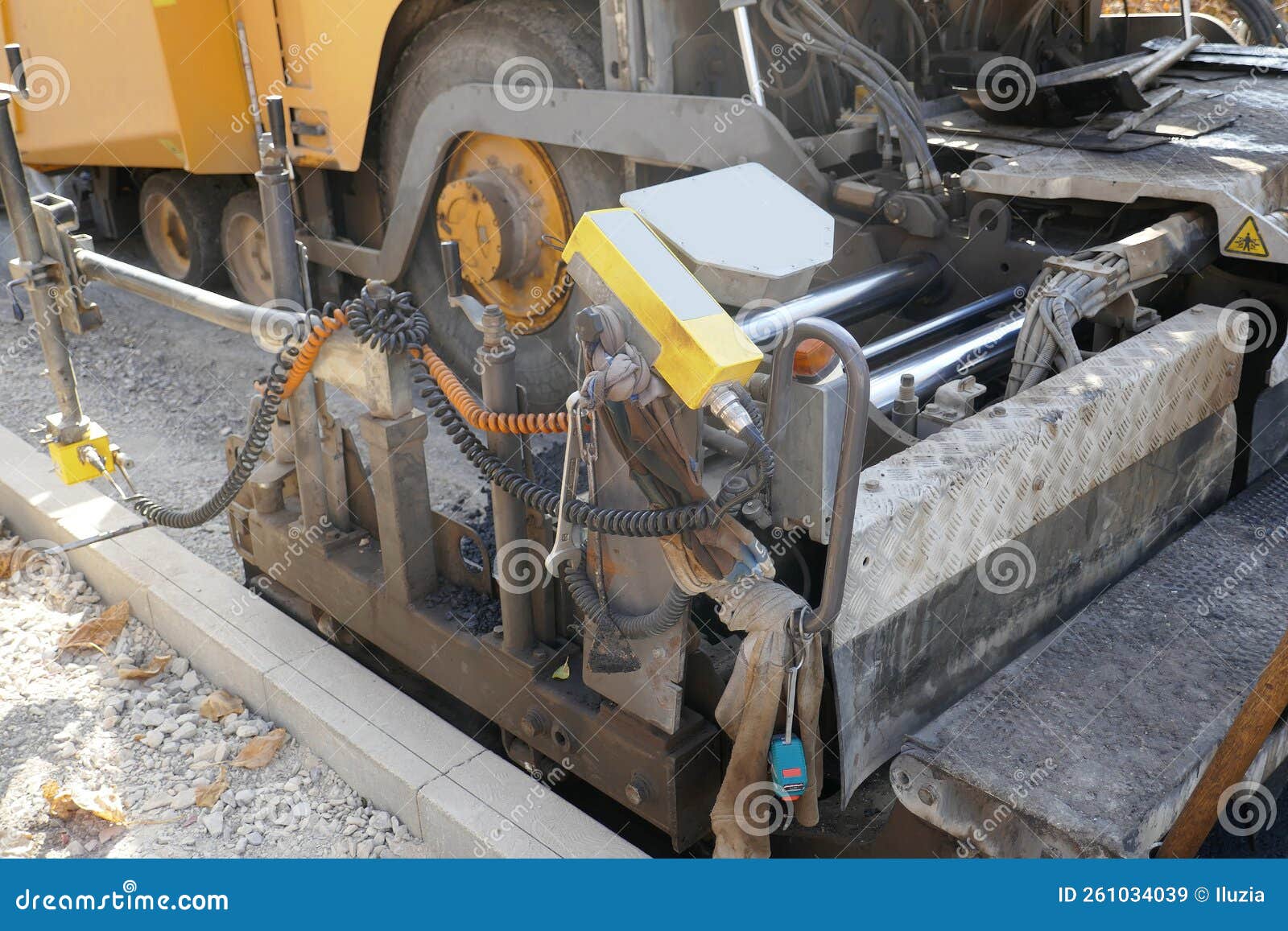A Paving Machine Placing Fresh Asphalt or Bitumen on a Gravel Base ...