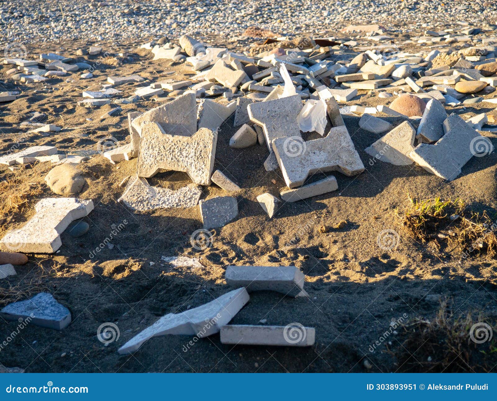 Paving Slabs are Scattered on the Sand. Embankment after the Storm ...