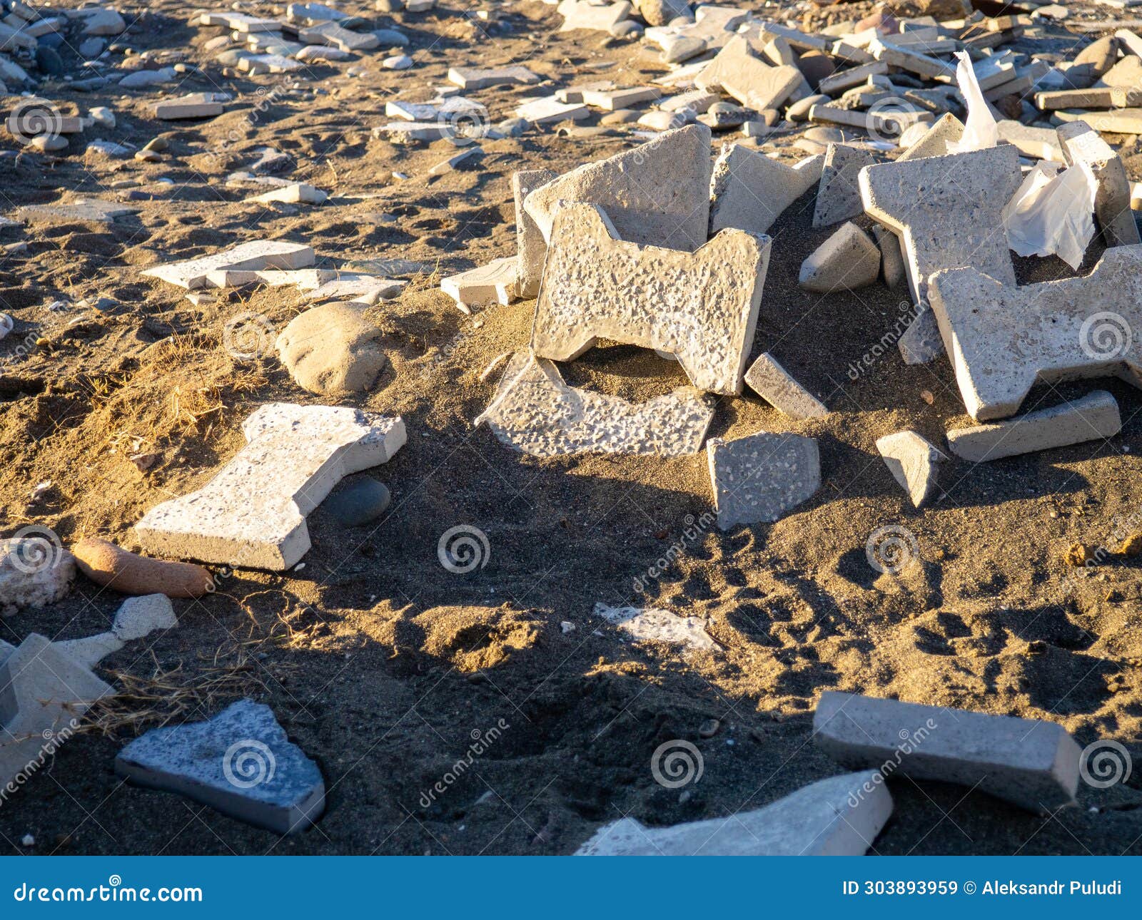 Paving Slabs are Scattered on the Sand. Embankment after the Storm ...
