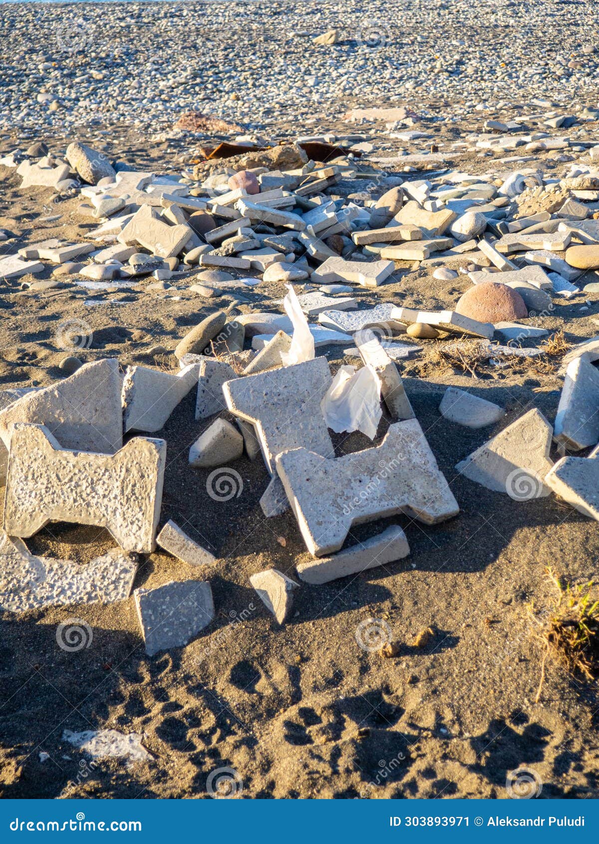 Paving Slabs are Scattered on the Sand. Embankment after the Storm ...
