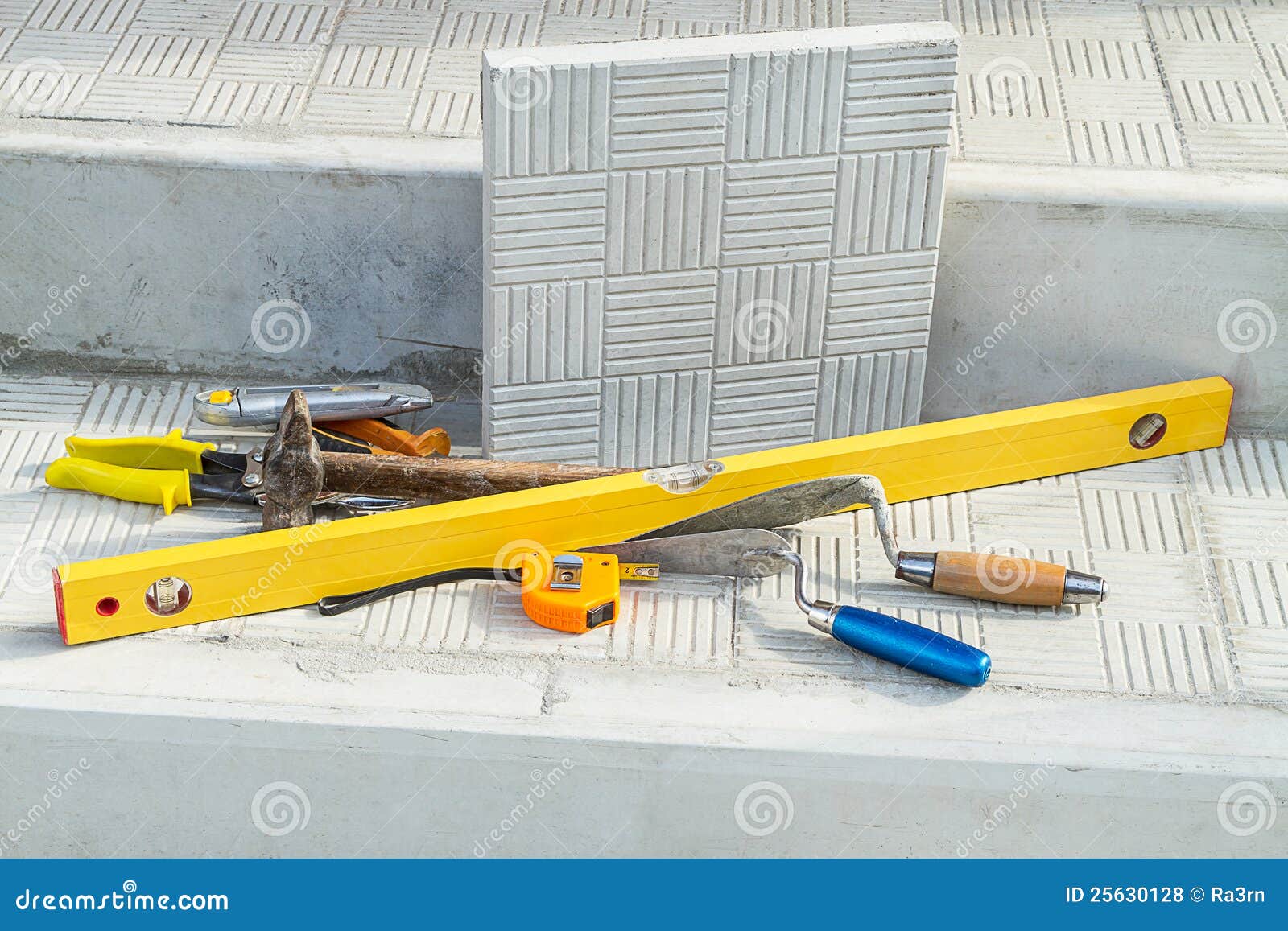 Paving Slabs and Tools for Laying Tiles Stock Photo - Image of ...