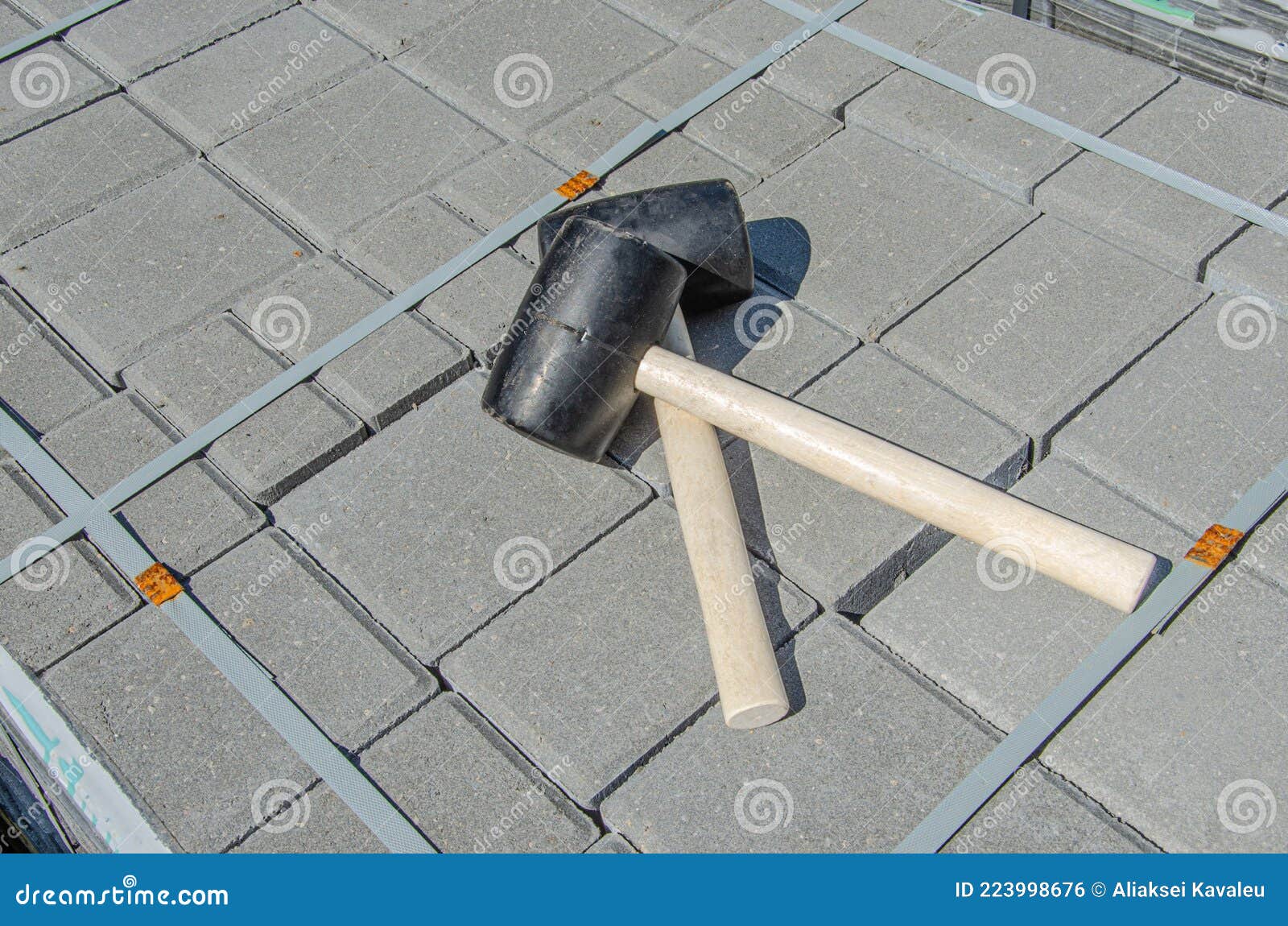 Paving Stones Paving. Installing Tools Rubber Hammer on Foreground ...