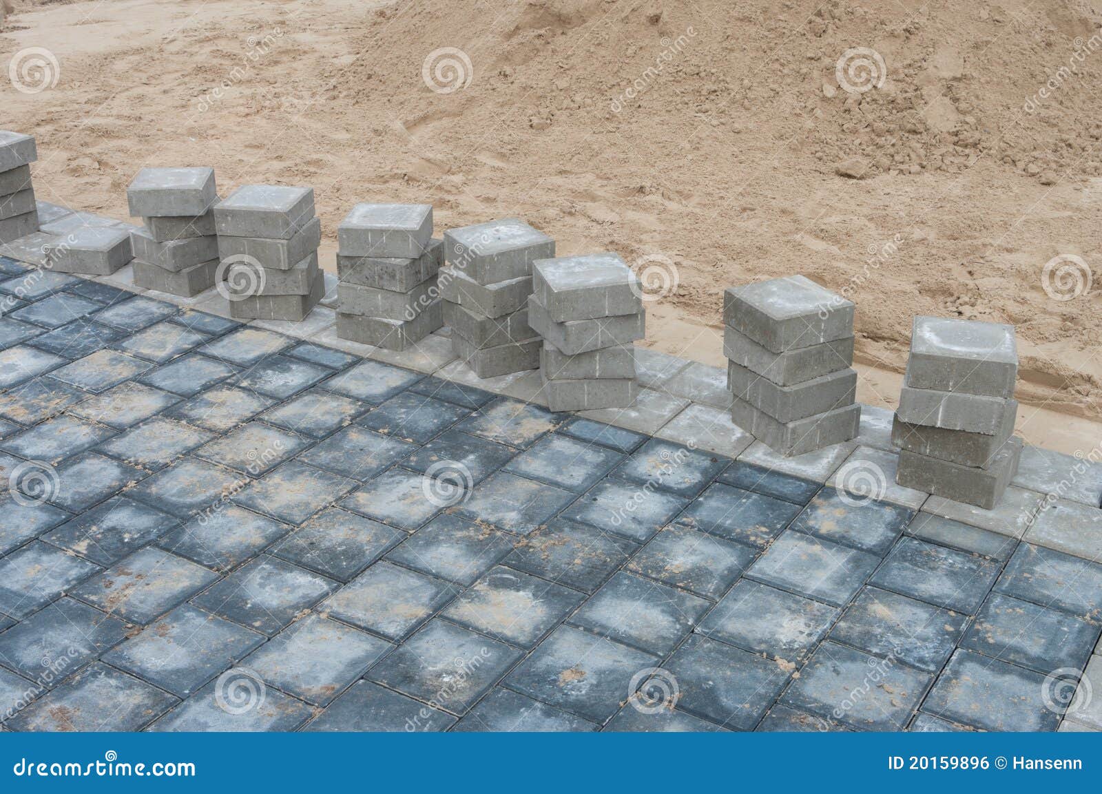 Paving a street stock photo. Image of outdoor, concrete - 20159896