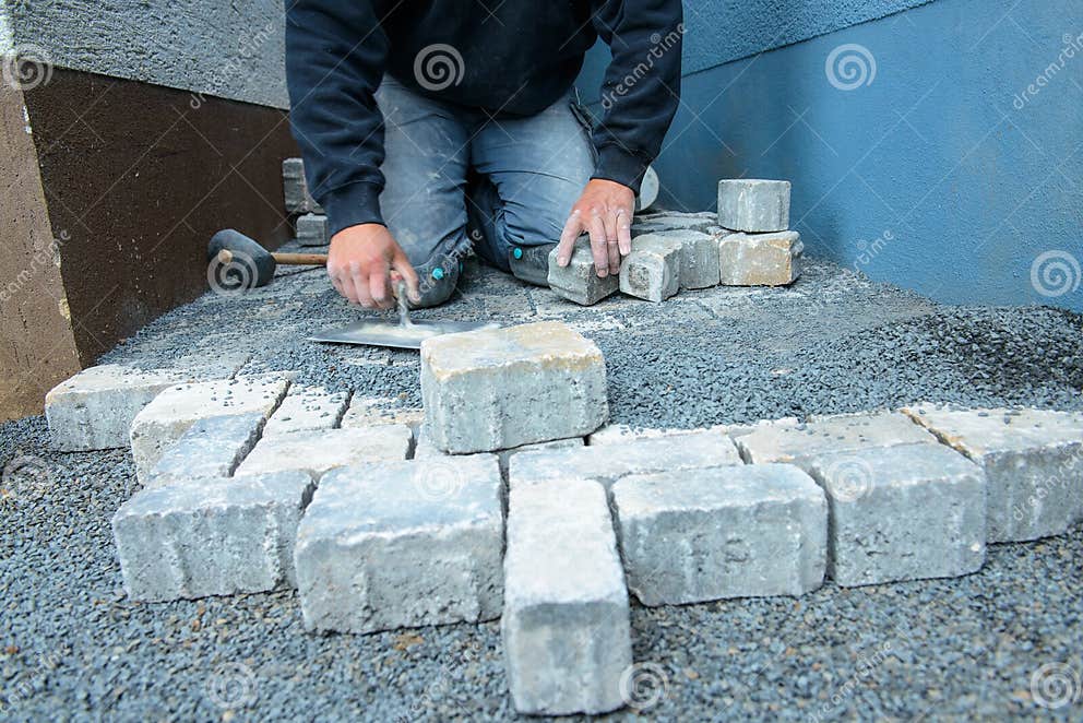 Pavior stock photo. Image of avenue, hammer, hand, grass - 101388722