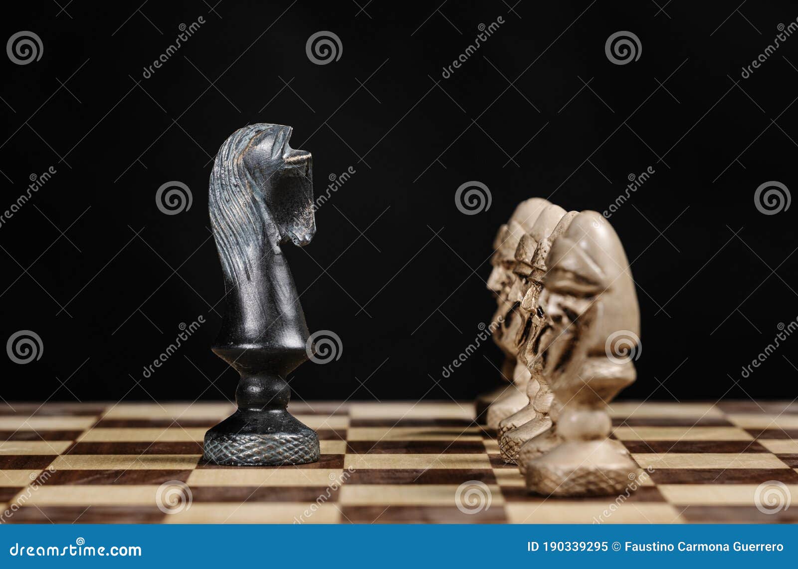 Pawn Chess Pieces Facing the Knight on a Chessboard Stock Image - Image ...