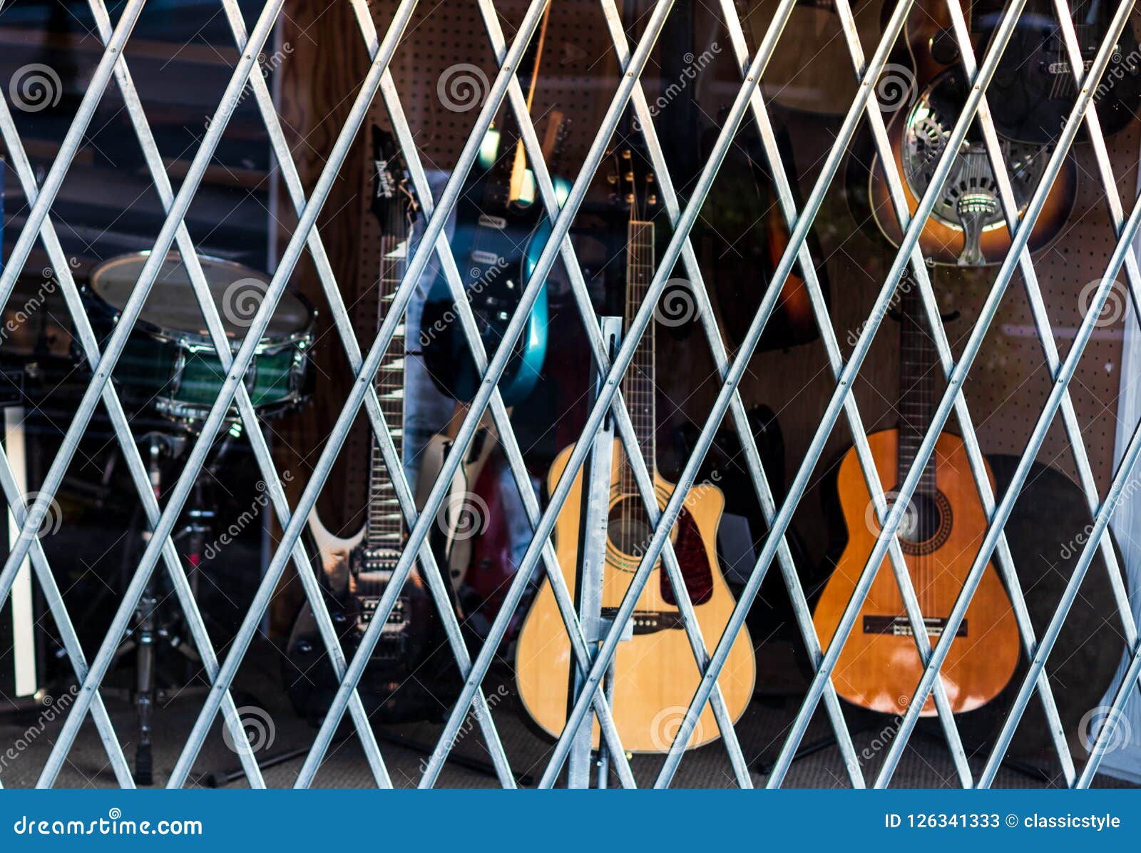 Pawn Shop Window Covered by Bars Stock Image - Image of drum, hawk ...