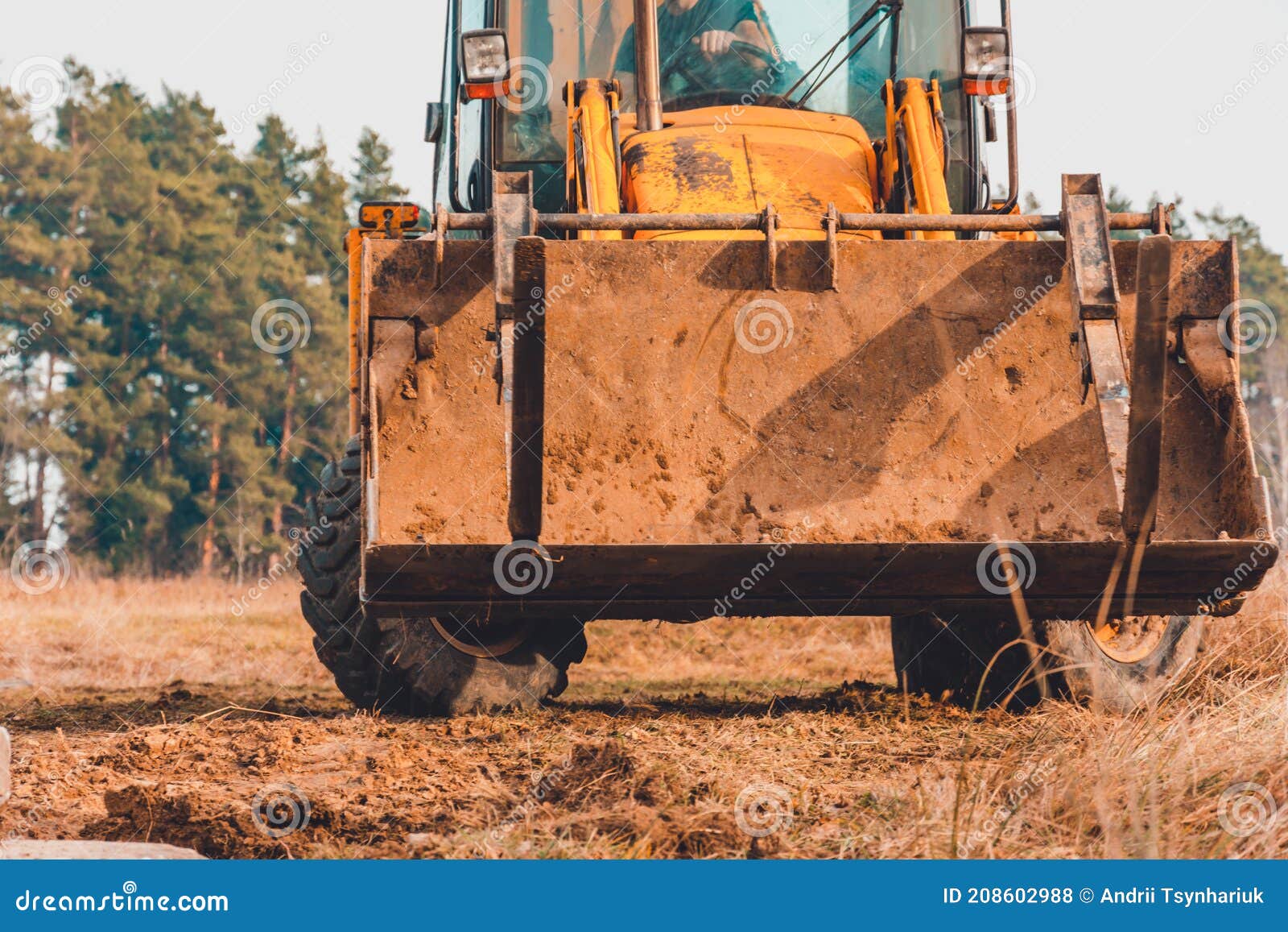 Paws of the Excavator. the Bucket Excavator Pulls Up Concrete Slabs To ...
