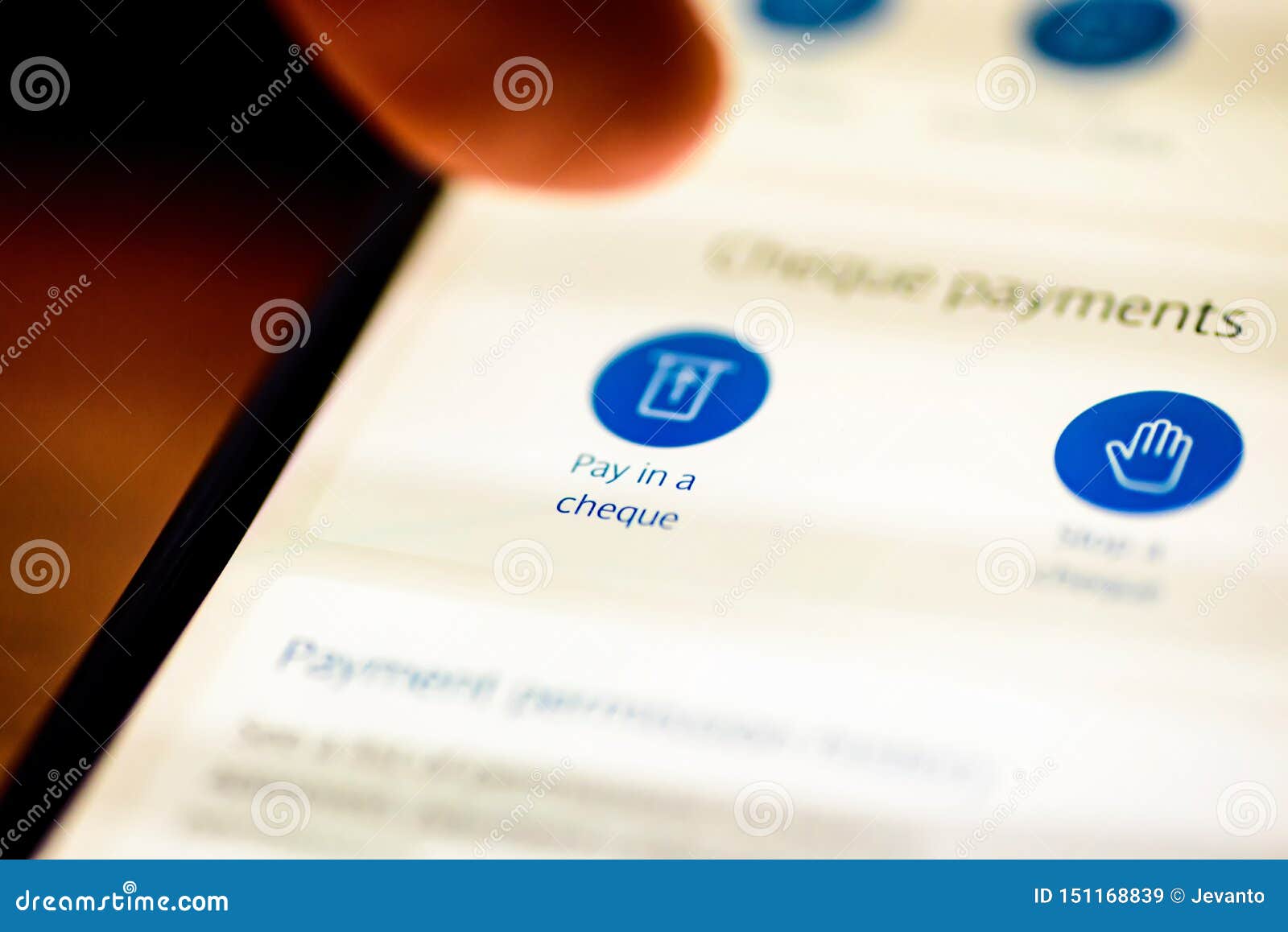 Pay in Cheque Button on Smartphone App Screen Closeup with Human Finger ...