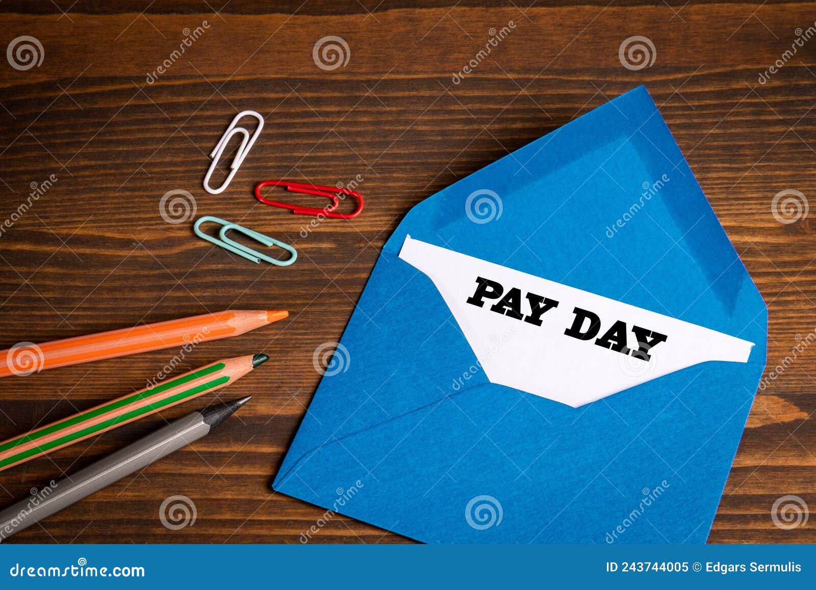 Pay Day. Blue Letter on a Brown Wood Texture Table Stock Image - Image ...