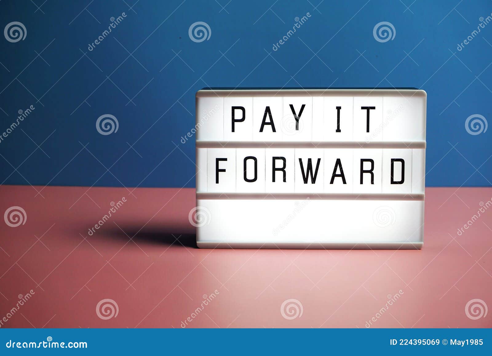 Pay it Forward Word in Light Box on Blue and Pink Background Stock ...