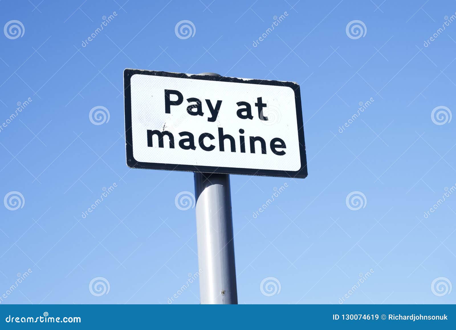 Pay at Machine Sign Against Empty Blue Sky Stock Image - Image of post ...