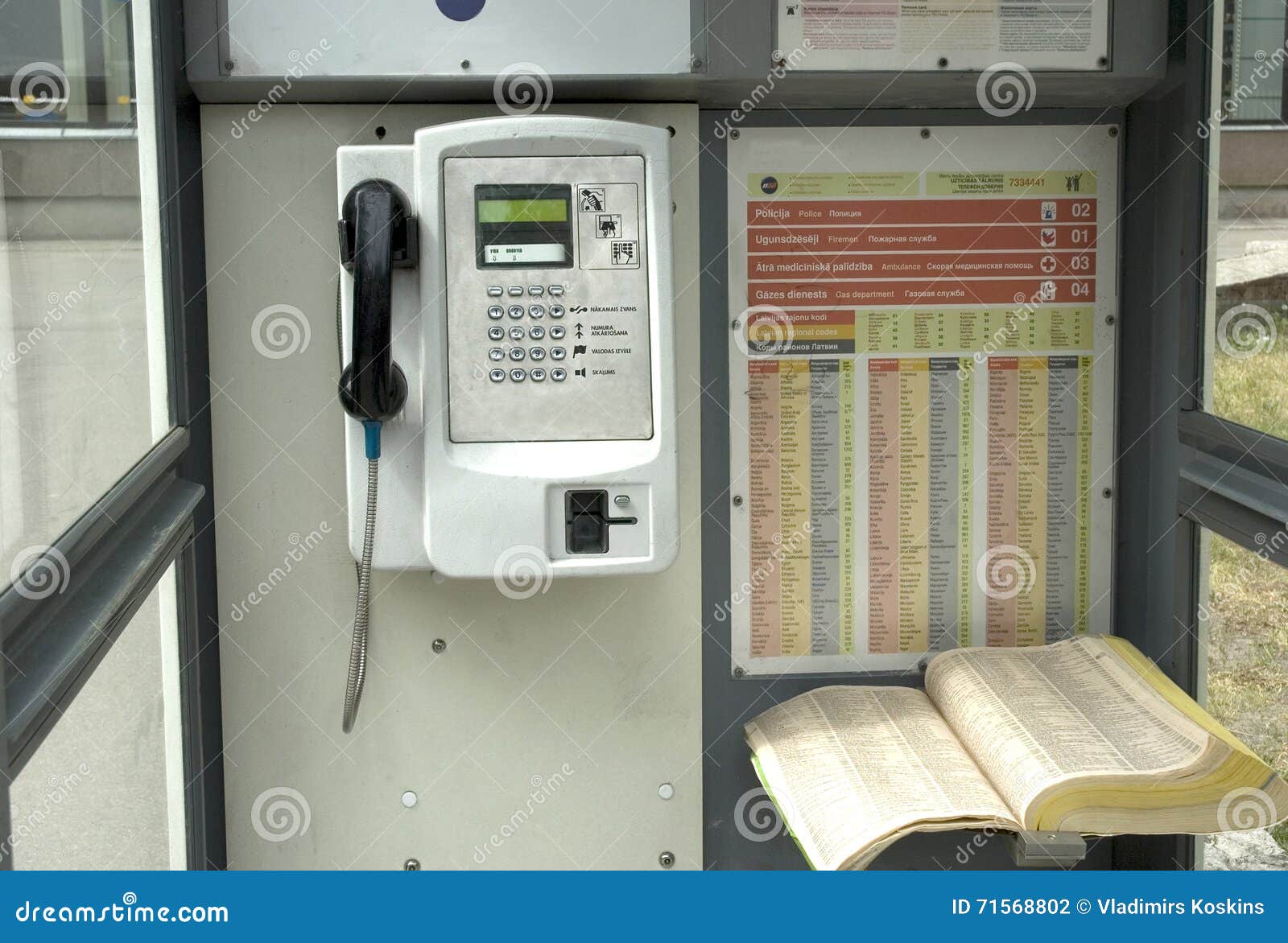 Pay Phone with Phone and the Book Stock Photo - Image of glass, buttons ...