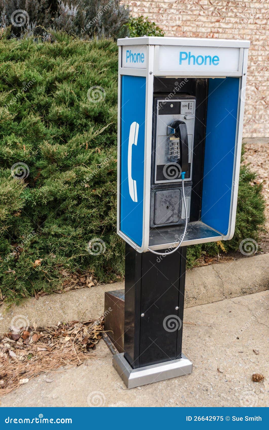 Pay Phone on a Sidewalk stock image. Image of communication - 26642975