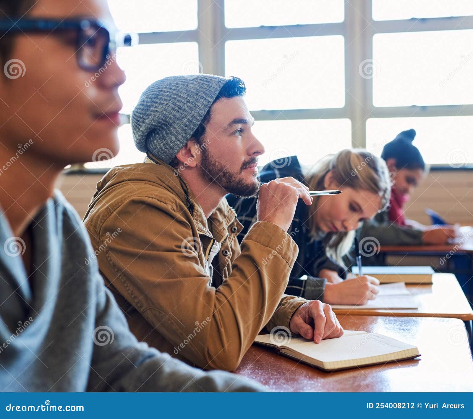 Paying Full Attention in Class. a Group of University Students Working ...